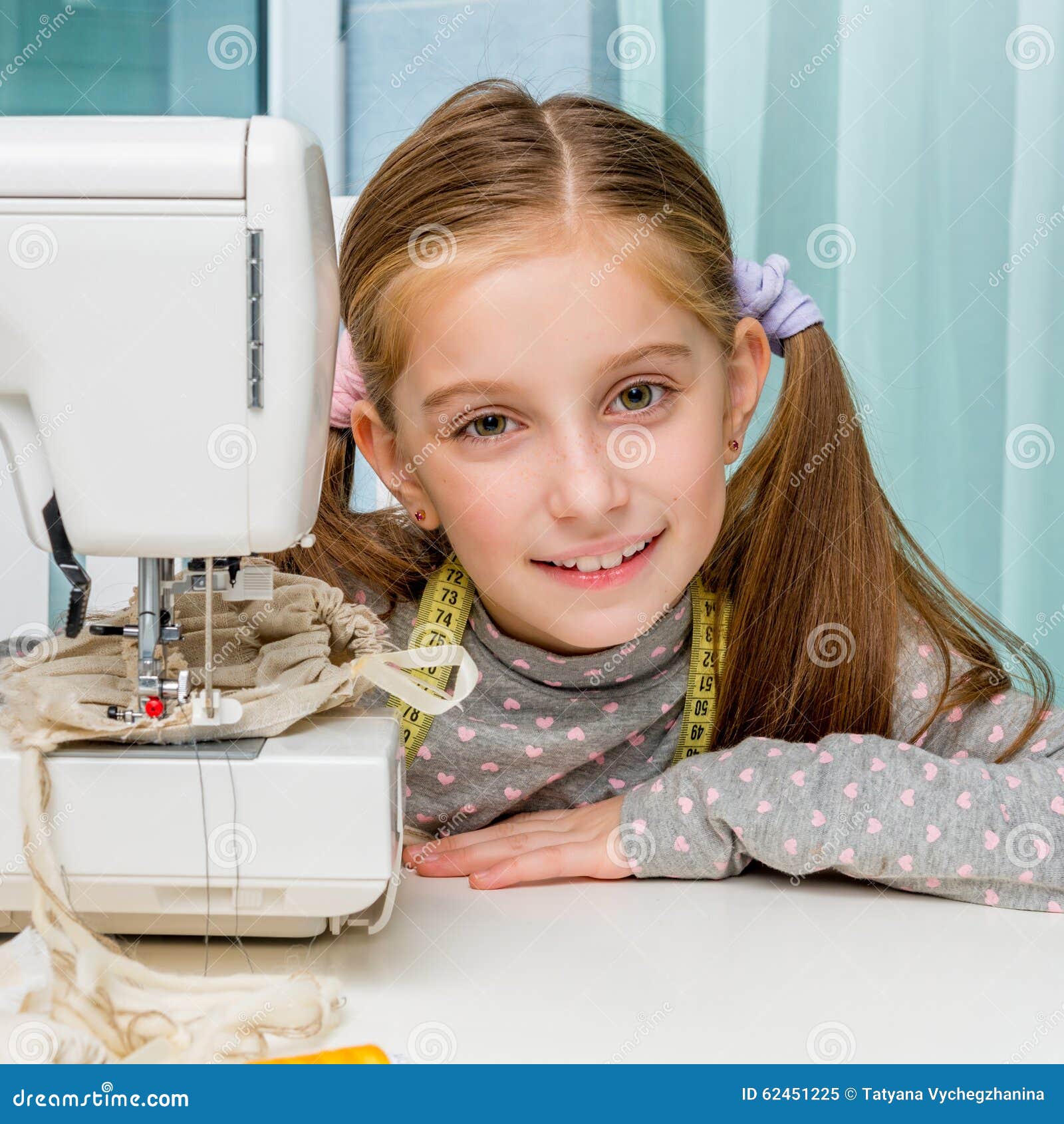 Smiling Little Girl at the Table with Sewing Stock Image - Image of ...