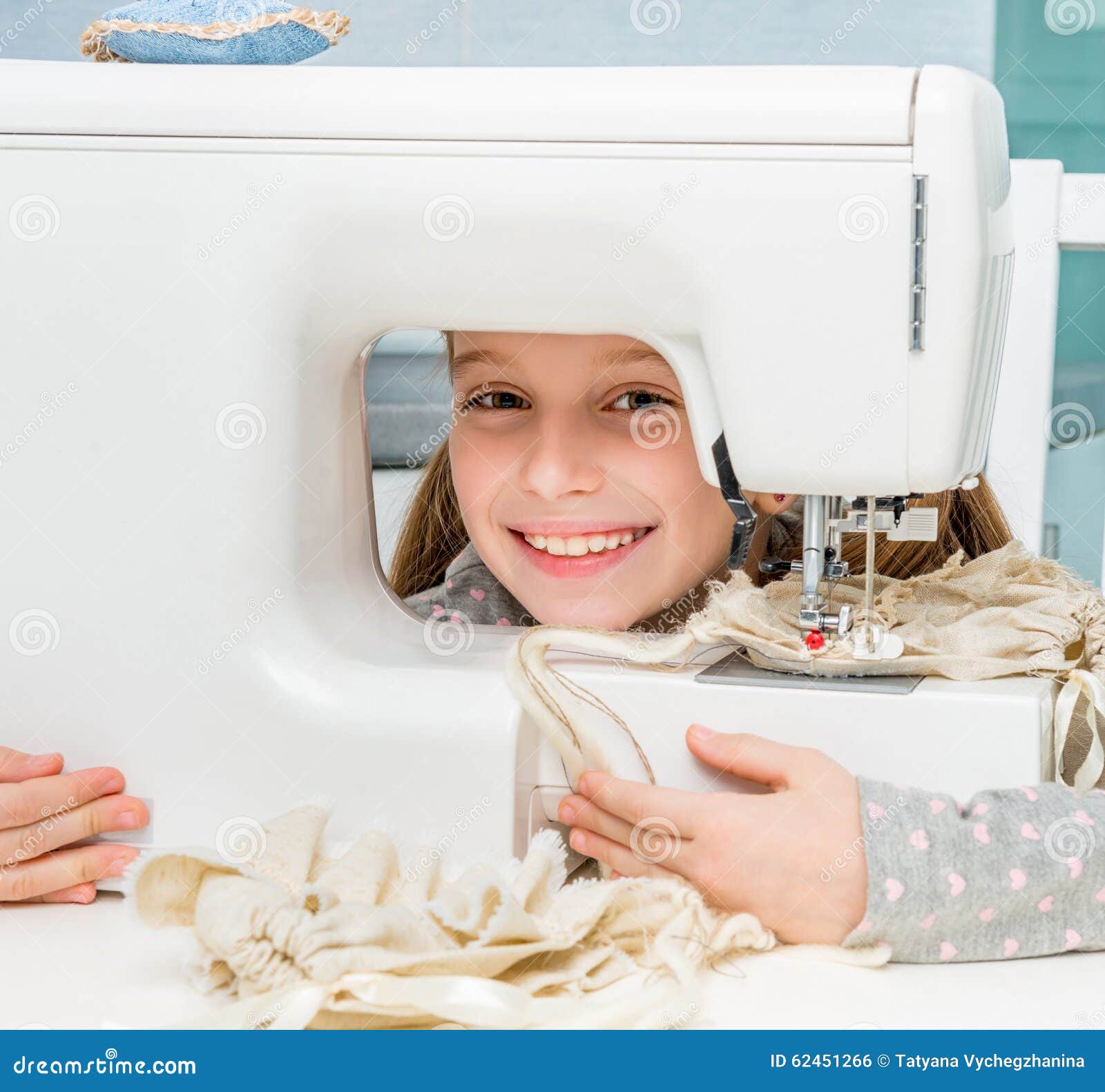 Smiling Little Girl at the Table with Sewing Stock Photo - Image of ...