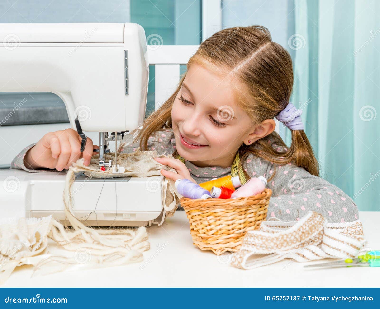 Smiling Little Girl at the Table with Sewing Stock Image - Image of ...
