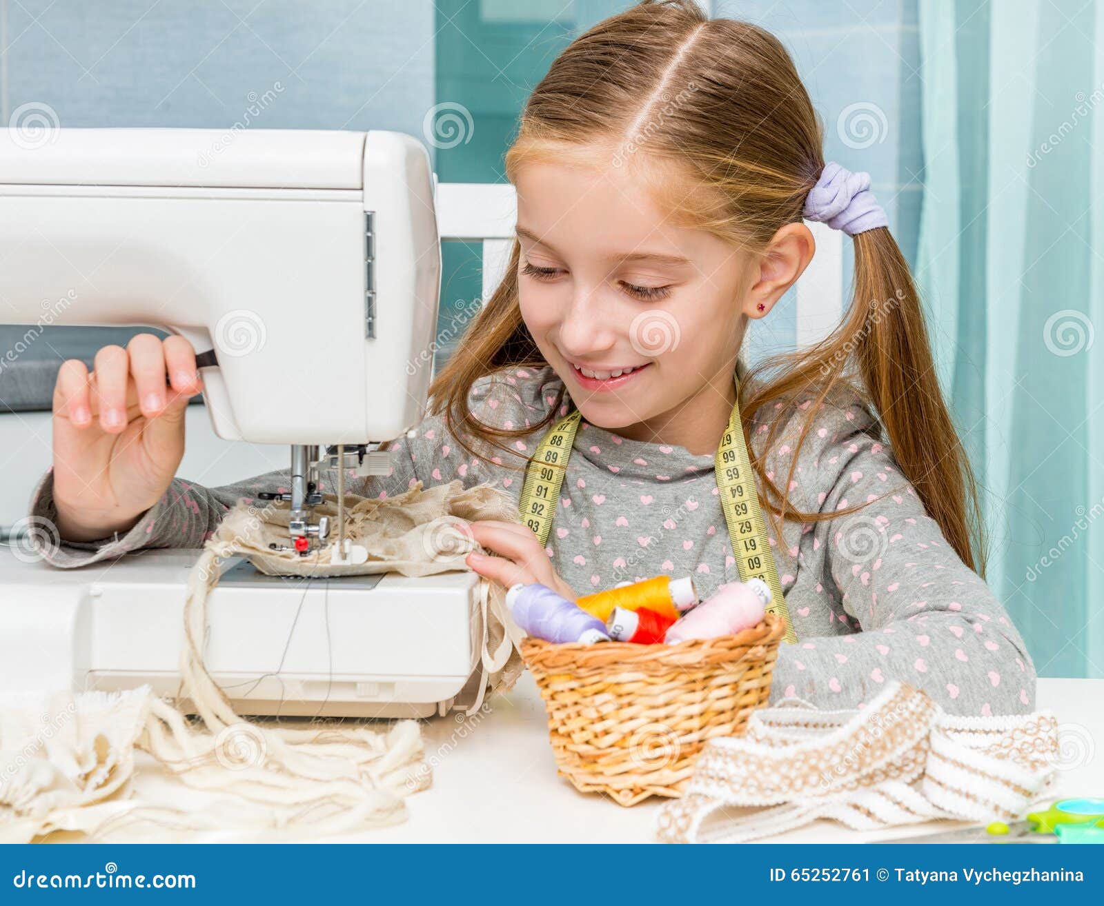 Smiling Little Girl at the Table with Sewing Stock Image - Image of ...