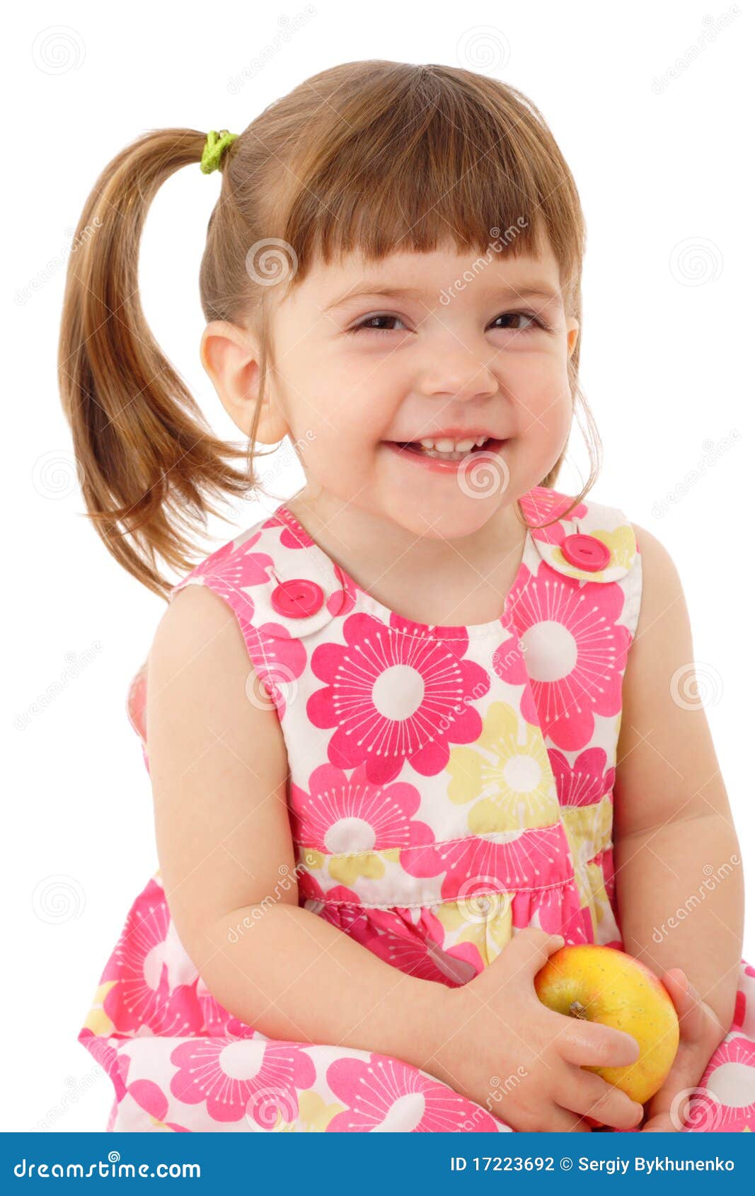 Smiling Little Girl with Yellow Apple Stock Photo - Image of smiling ...