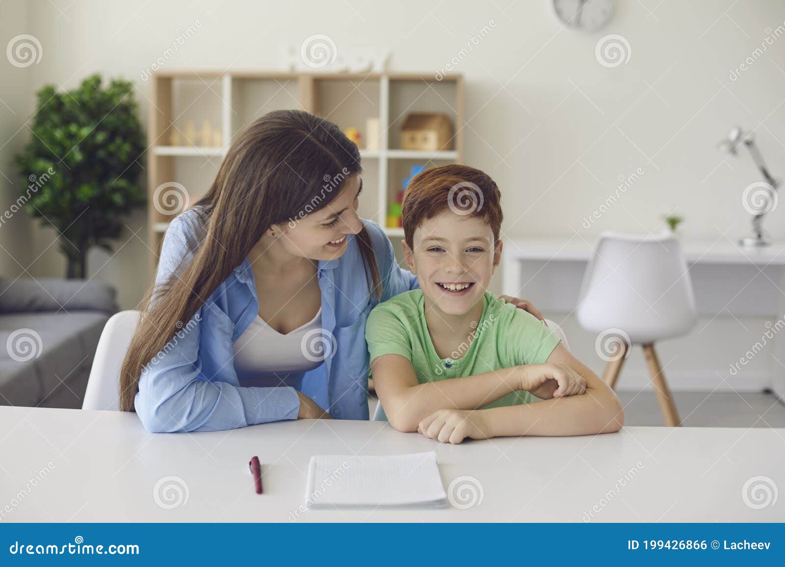 Little Boy is Going To Write Down Tasks on a Piece of Paper with the ...