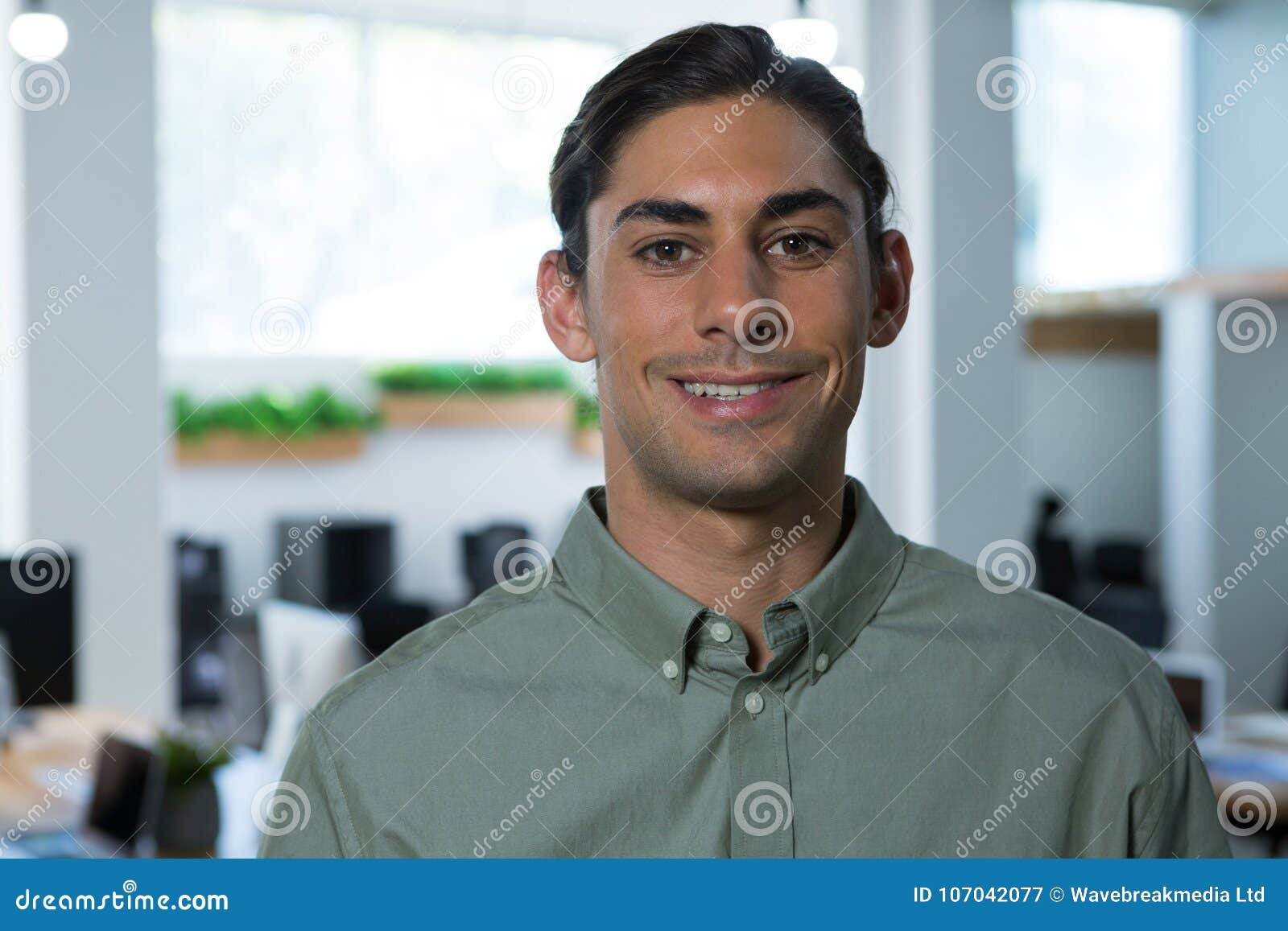 Male Executive Looking at Camera in the Office Stock Image - Image of ...