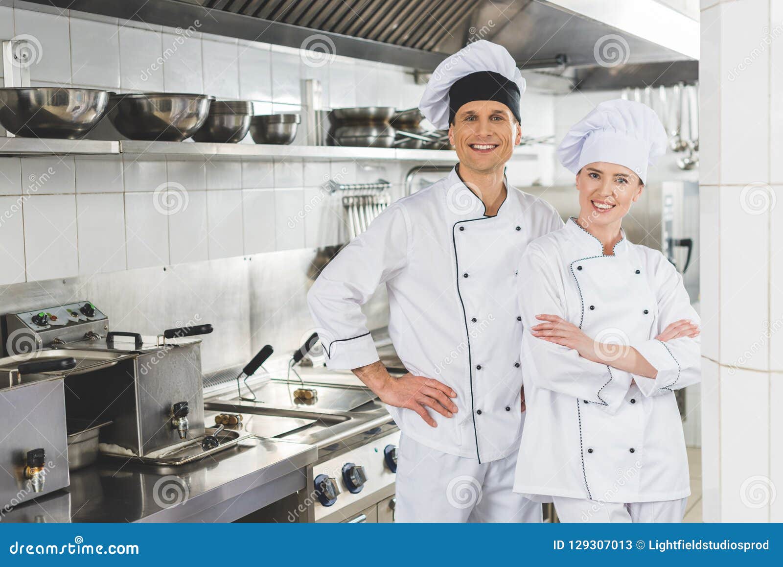 Smiling Male and Female Chefs Looking at Camera Stock Image - Image of ...