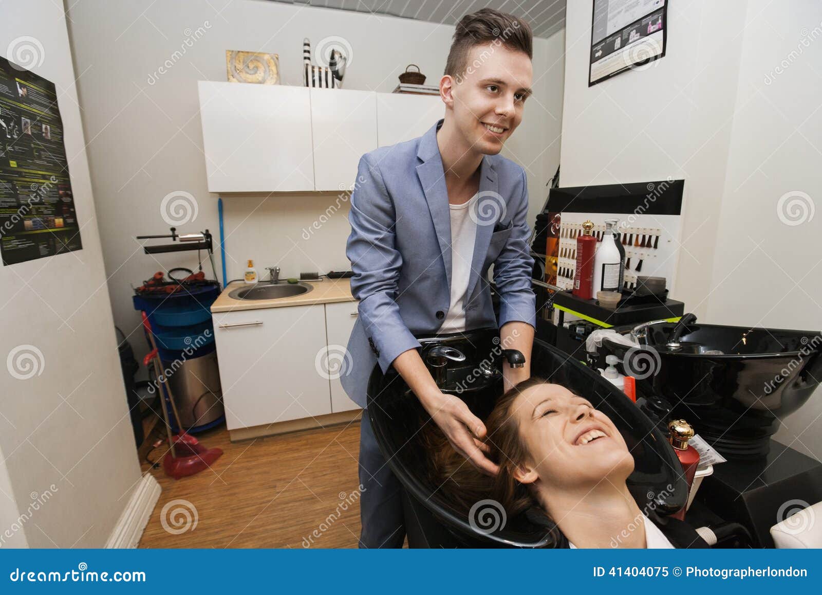 Smiling Male Hairstylist Washing Female Customer S Hair in Salon Stock ... Smiling Male Hairstylist Washing Female Customer S Hair in Salon Stock ...