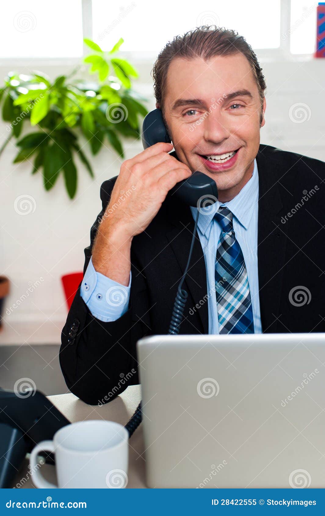 Smiling Male Manager Attending Clients Call Stock Image - Image of ...