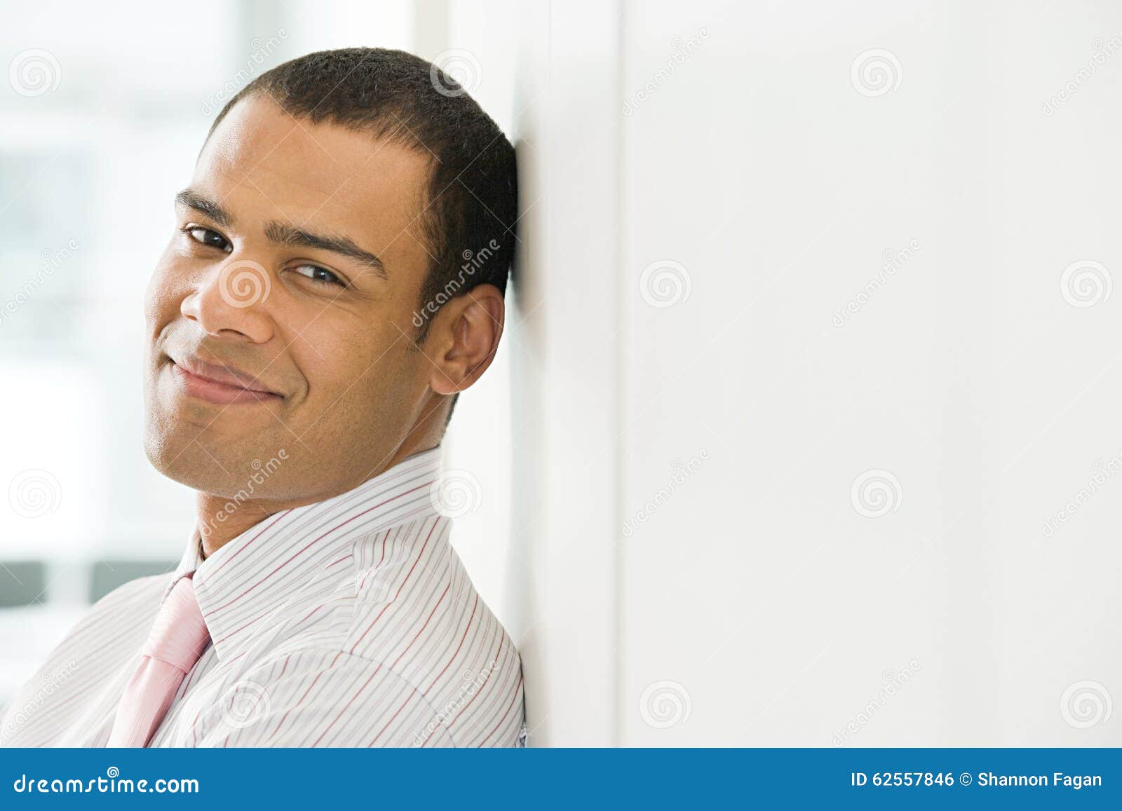 Smiling male office worker stock photo. Image of confidence - 62557846