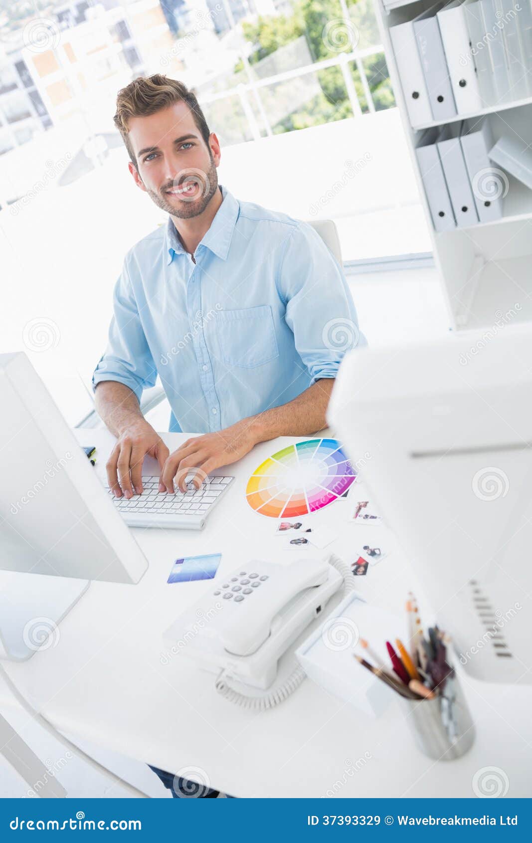 Smiling Male Photo Editor Using Computer Stock Image - Image of ...