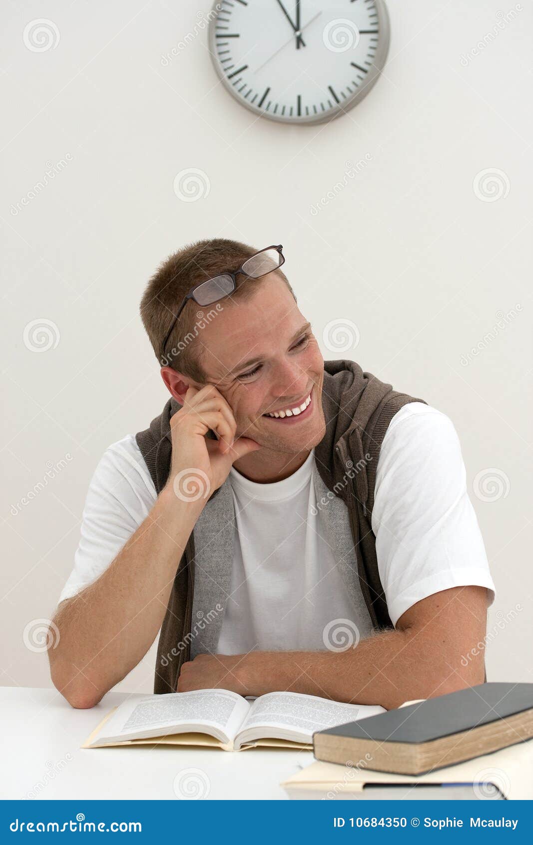 Smiling male student stock photo. Image of learn, paper - 10684350