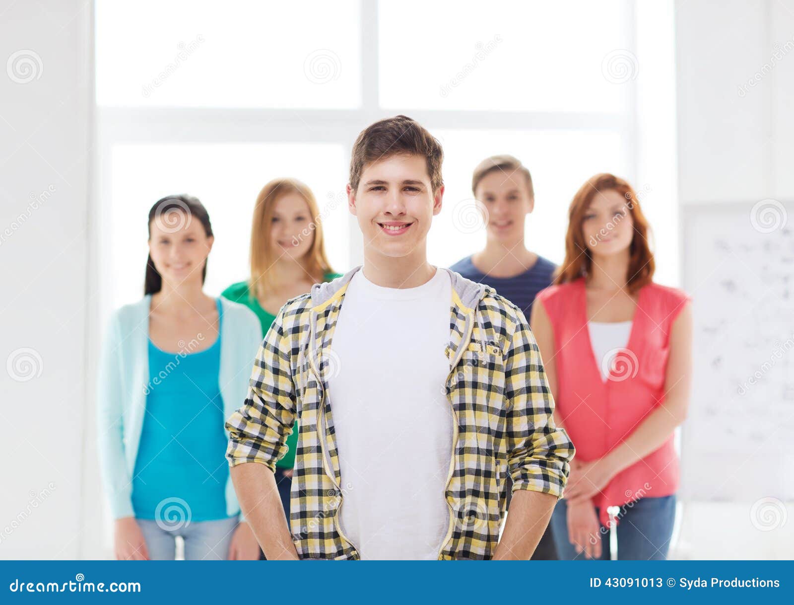 Smiling Male Student with Group of Classmates Stock Image - Image of ...