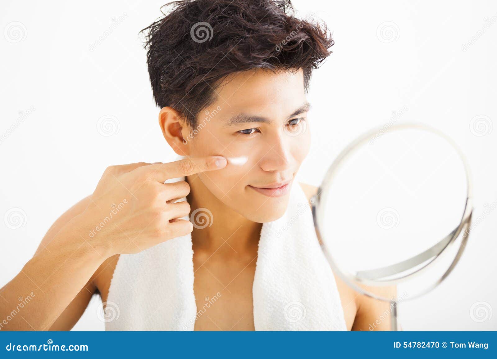 Smiling Man Applying Cream Lotion Stock Photo - Image of aftershave ...