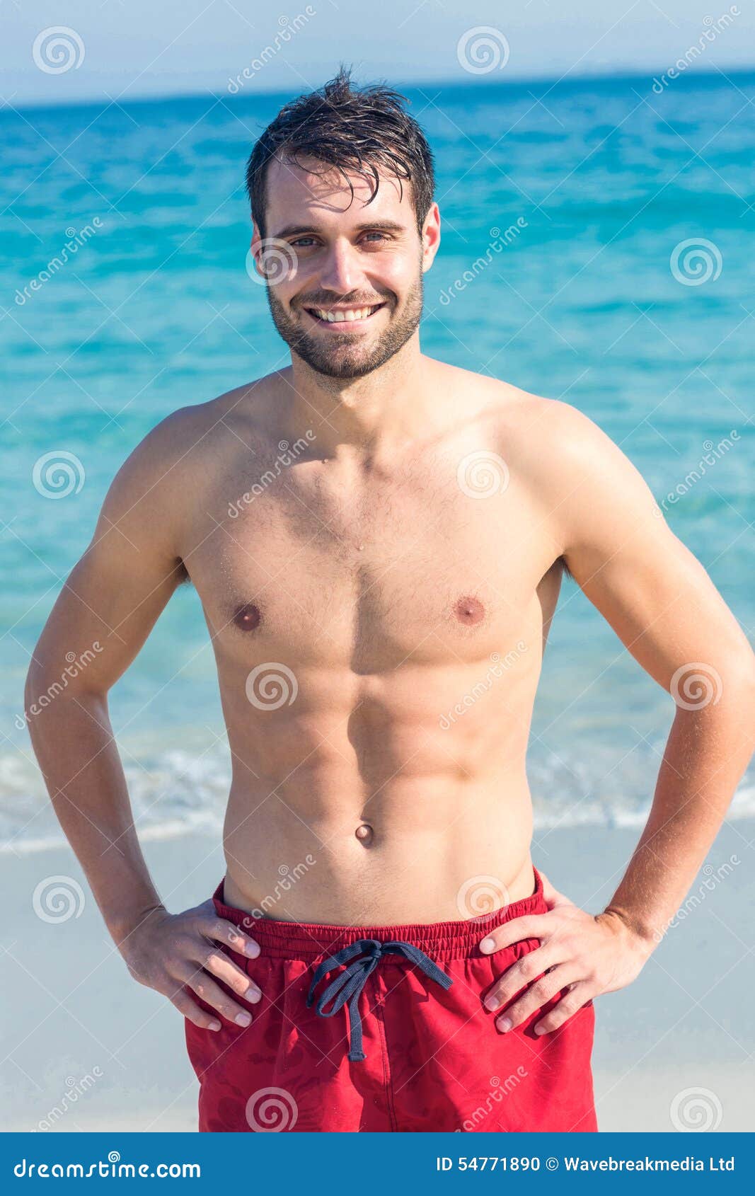 Smiling Man at the Beach Looking at Camera Stock Photo - Image of ...