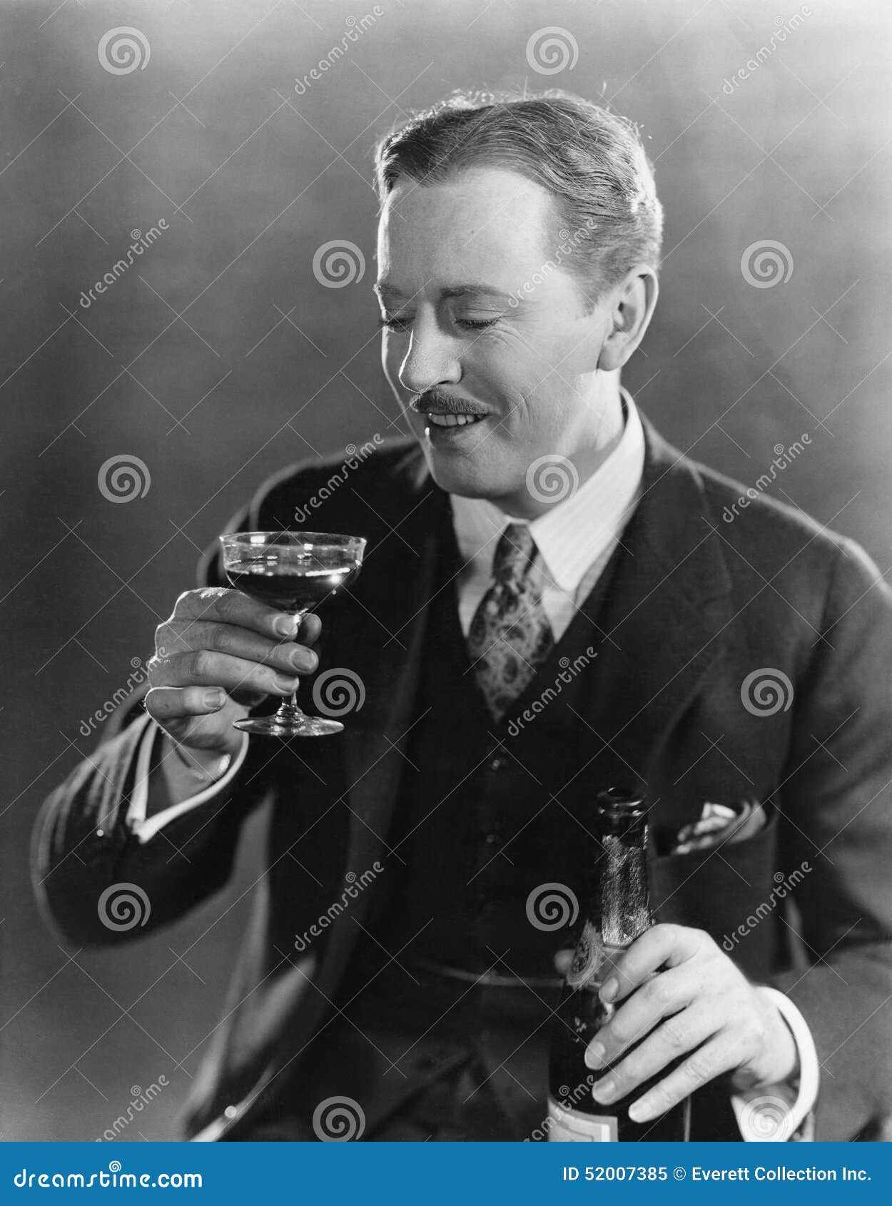 Smiling Man with Beverage and Bottle Stock Image - Image of attractive ...