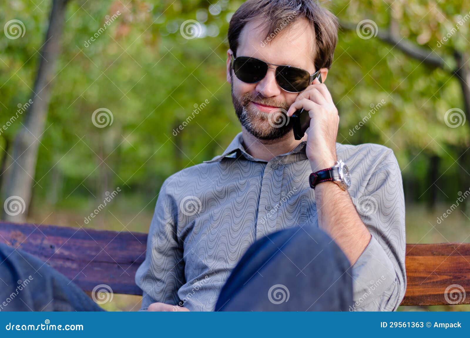 Smiling man calling stock image. Image of casual, alone - 29561363