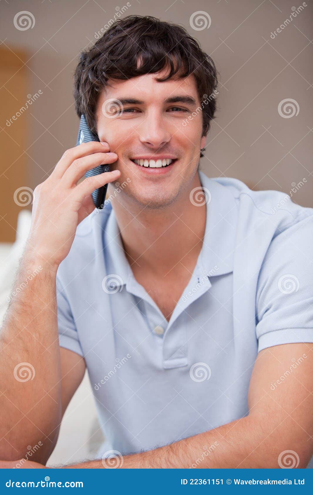 Smiling Man on the Cellphone Stock Image - Image of relaxing, sitting ...