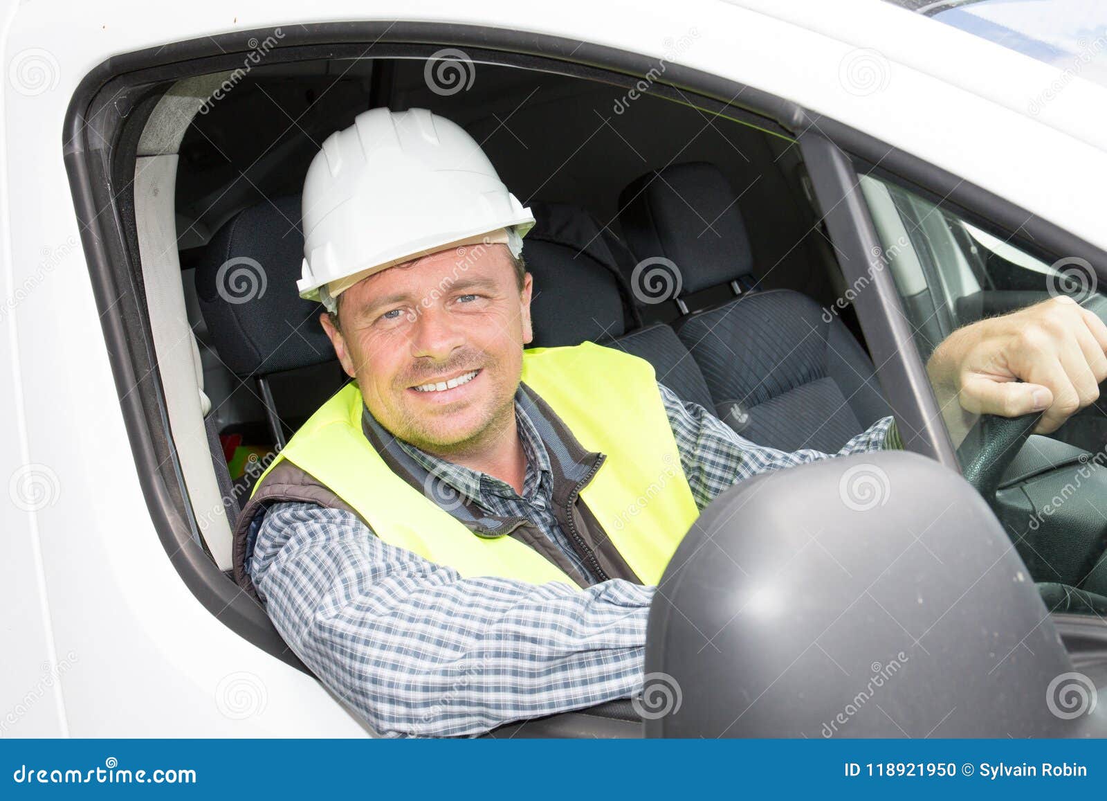 Smiling Man Construction Worker in Van Stock Photo - Image of people ...