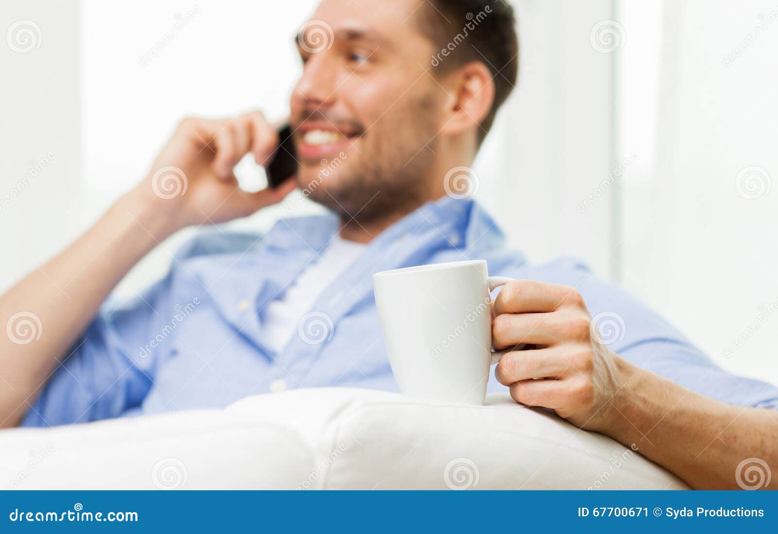 Smiling Man with Cup Calling on Smartphone at Home Stock Image - Image ...