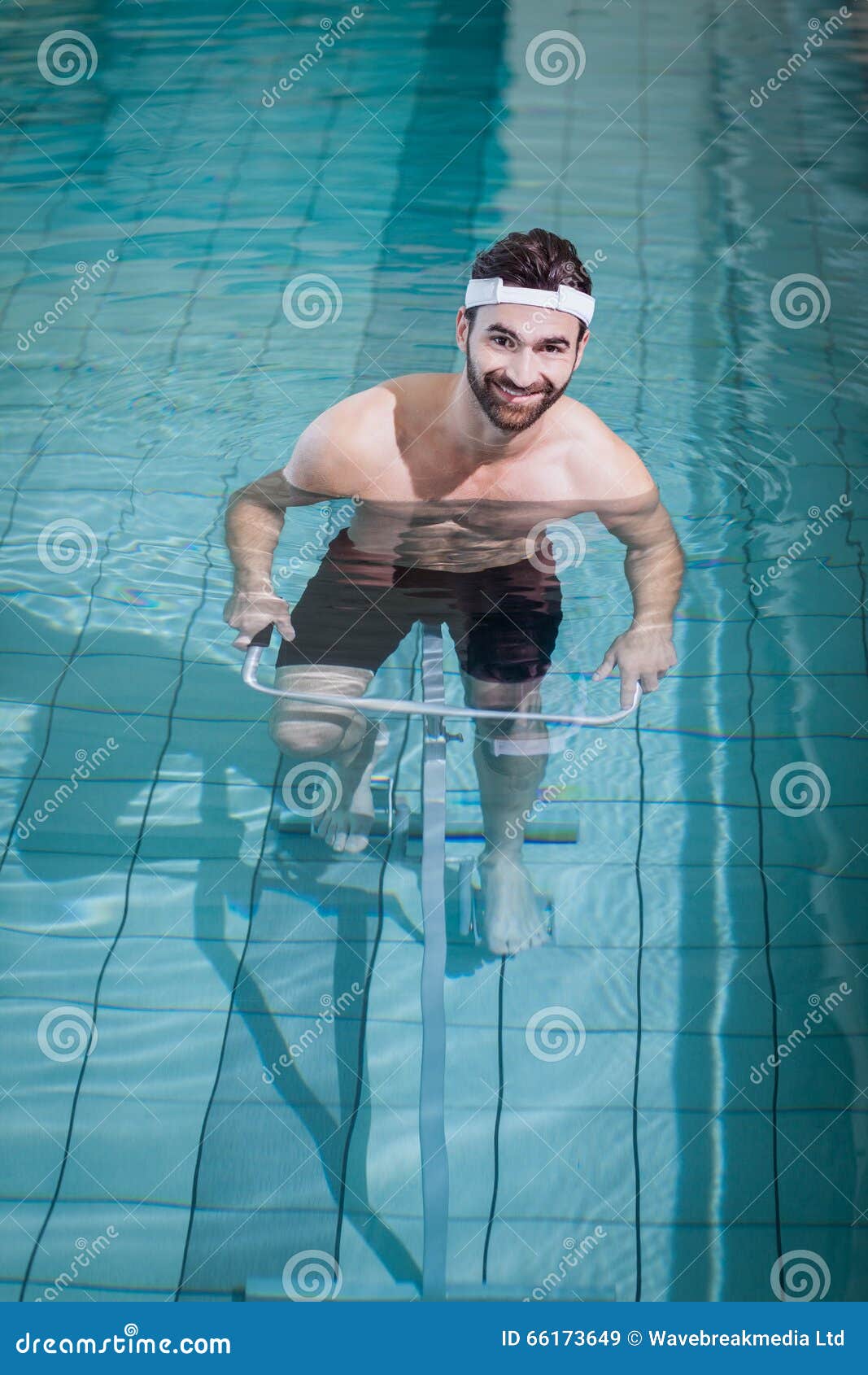 Smiling Man Doing Underwater Bike Stock Image - Image of smiling ...