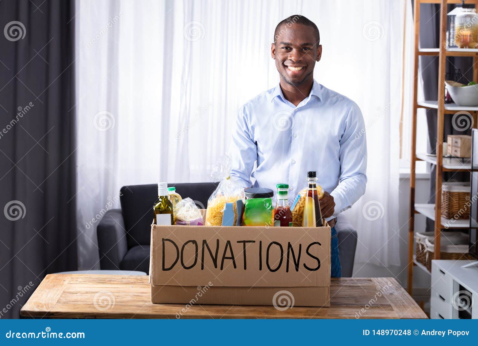 Smiling Man with Donation Box Stock Photo - Image of cheerful, help ...