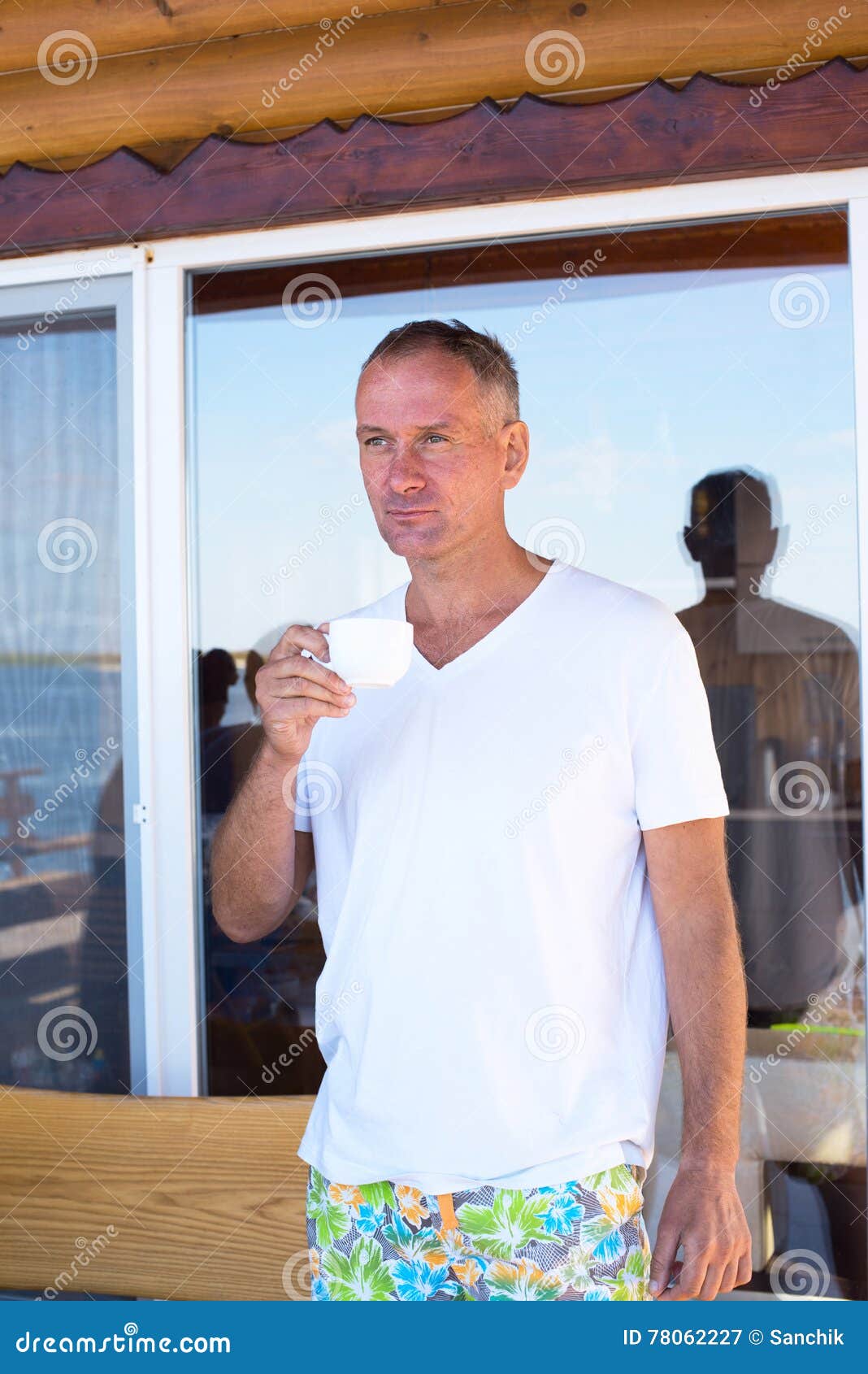 Smiling Man Drinking Coffee on Sea Coast Stock Image - Image of leisure ...