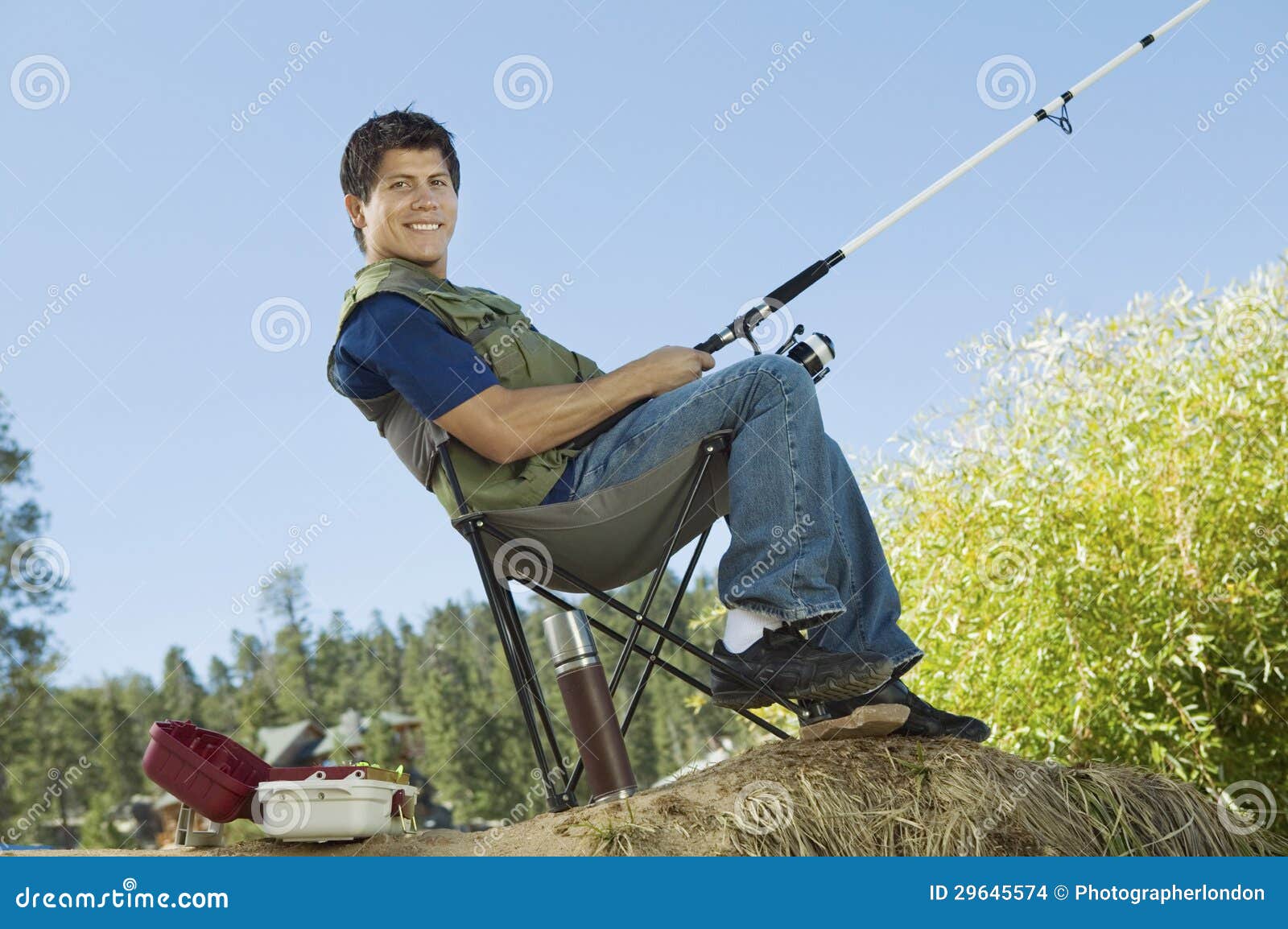 Smiling Man with Fishing Rod Stock Photo - Image of full, hobby: 29645574