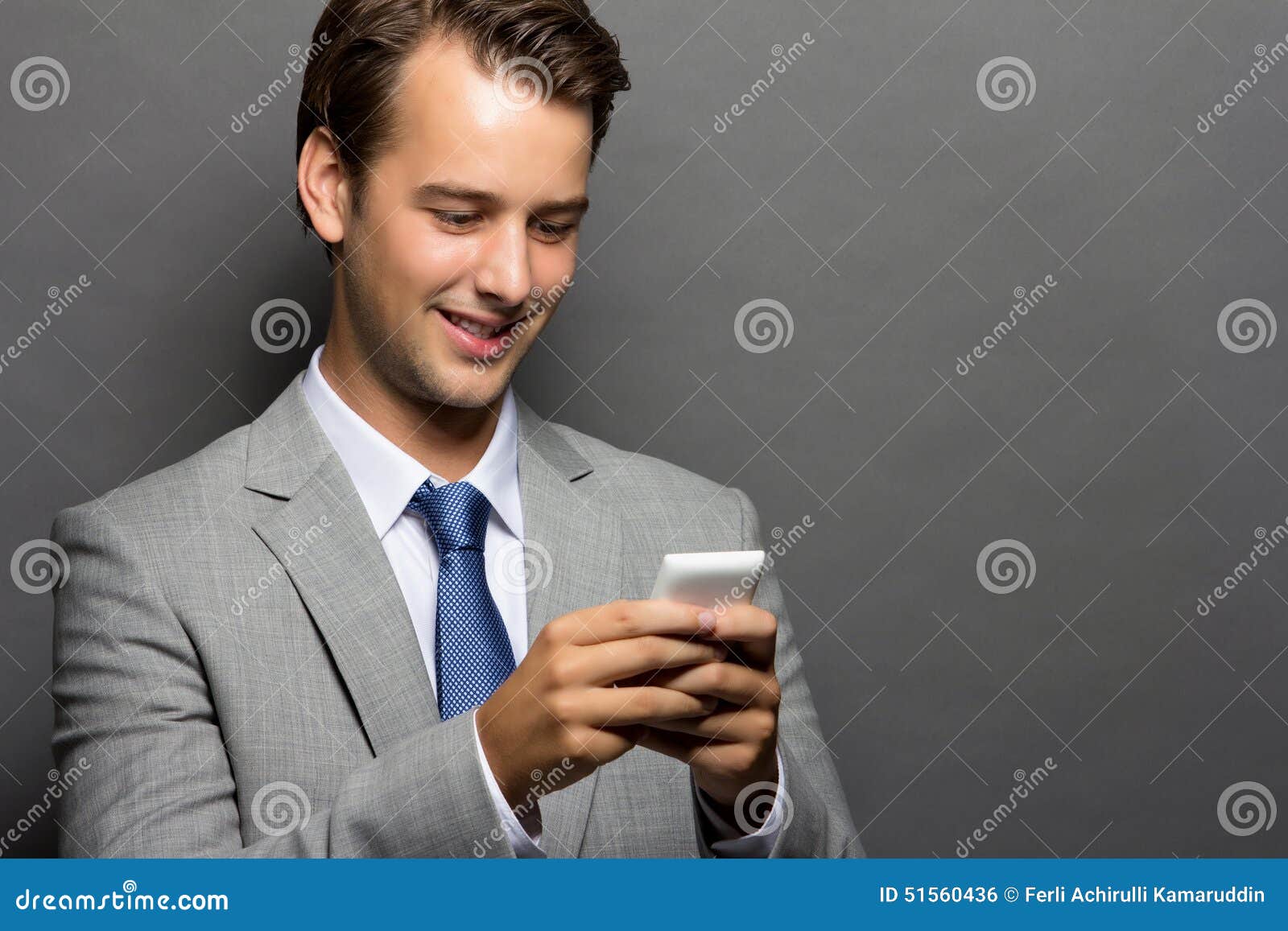 A Smiling Man with a Handphone Isolated Stock Photo - Image of ...