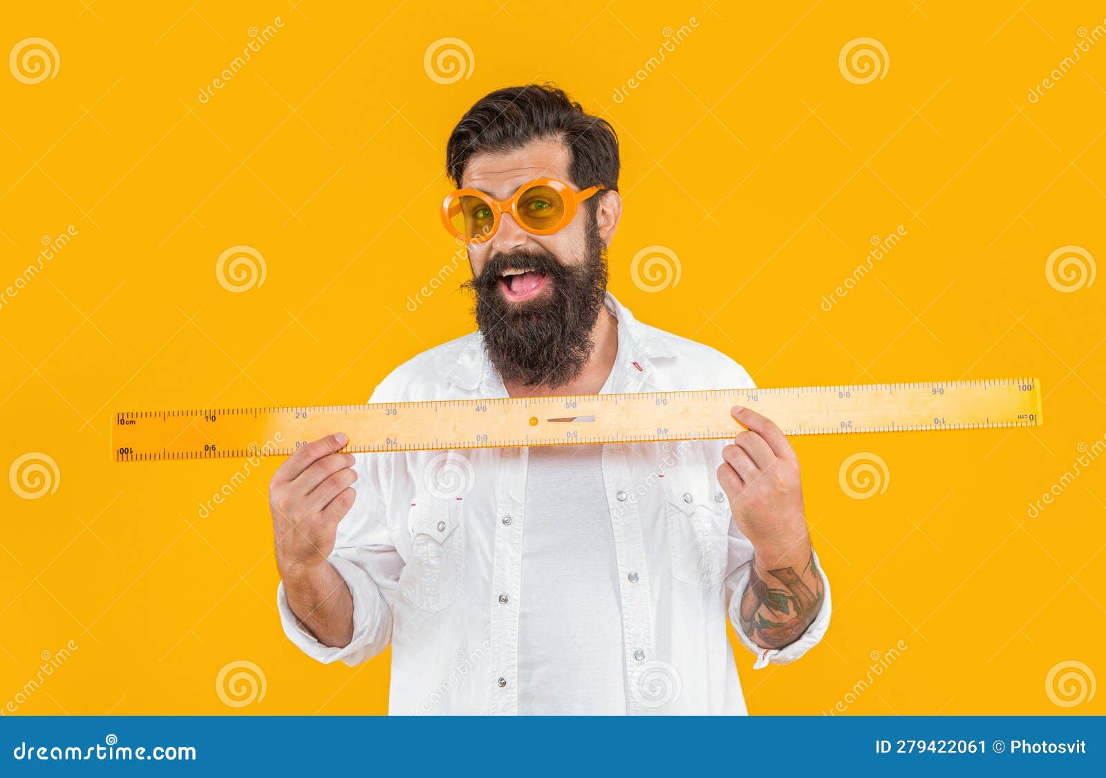 Smiling Man Hold Geometry Ruler on Background. Photo of Man Hold ...