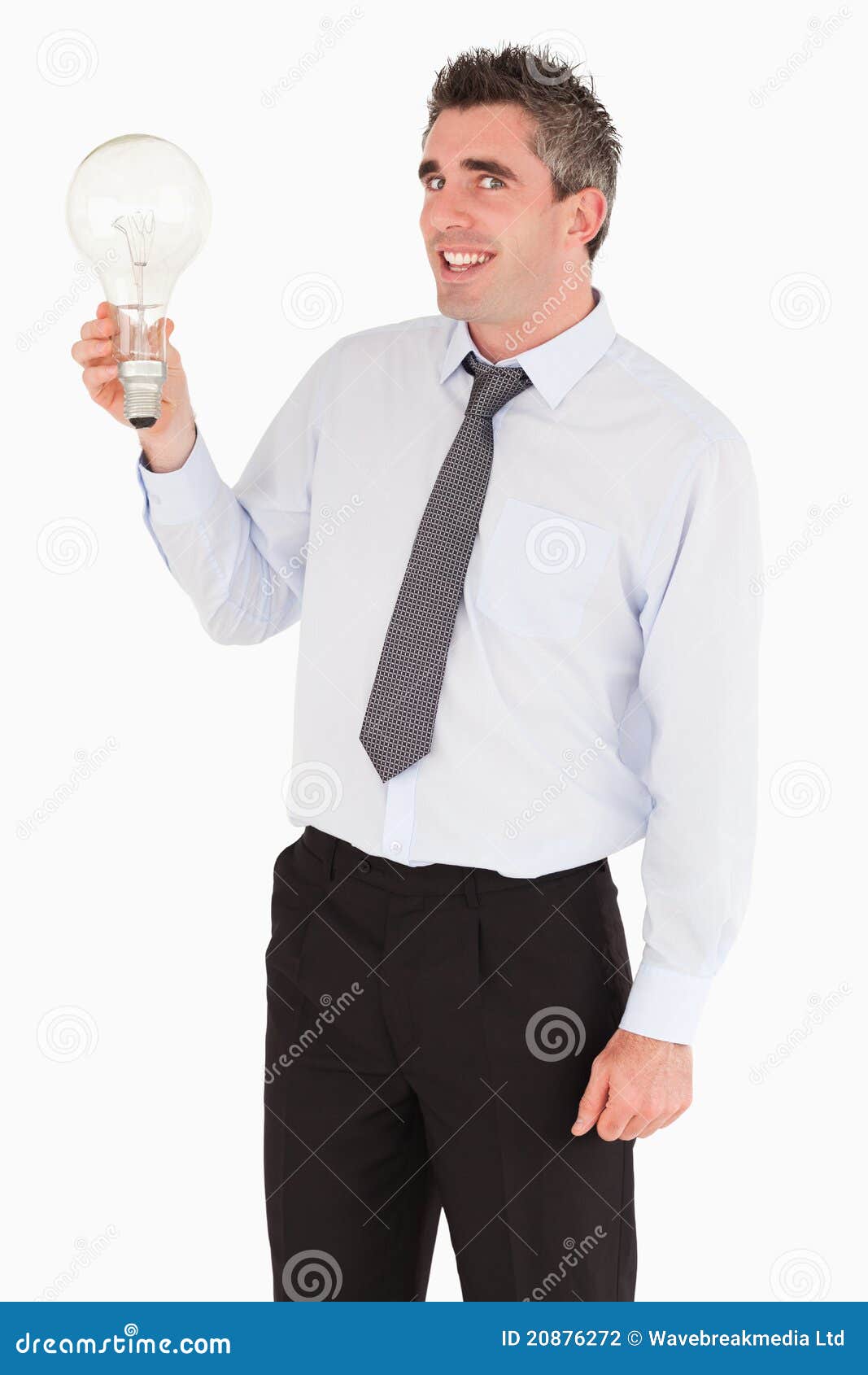 Smiling Man Holding a Light Bulb Stock Photo - Image of employee, happy ...