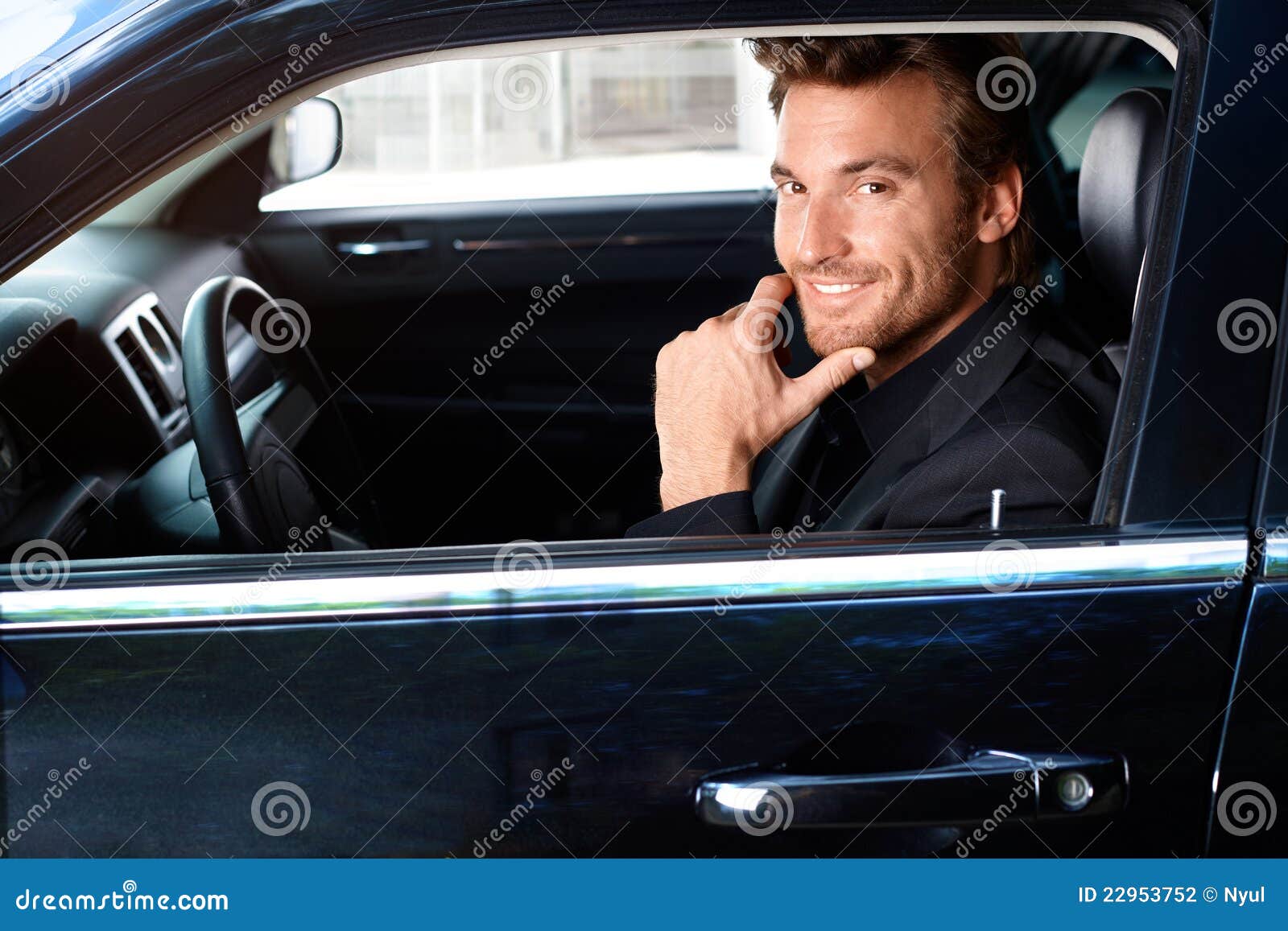 Smiling man in limousine stock photo. Image of luxurious - 22953752