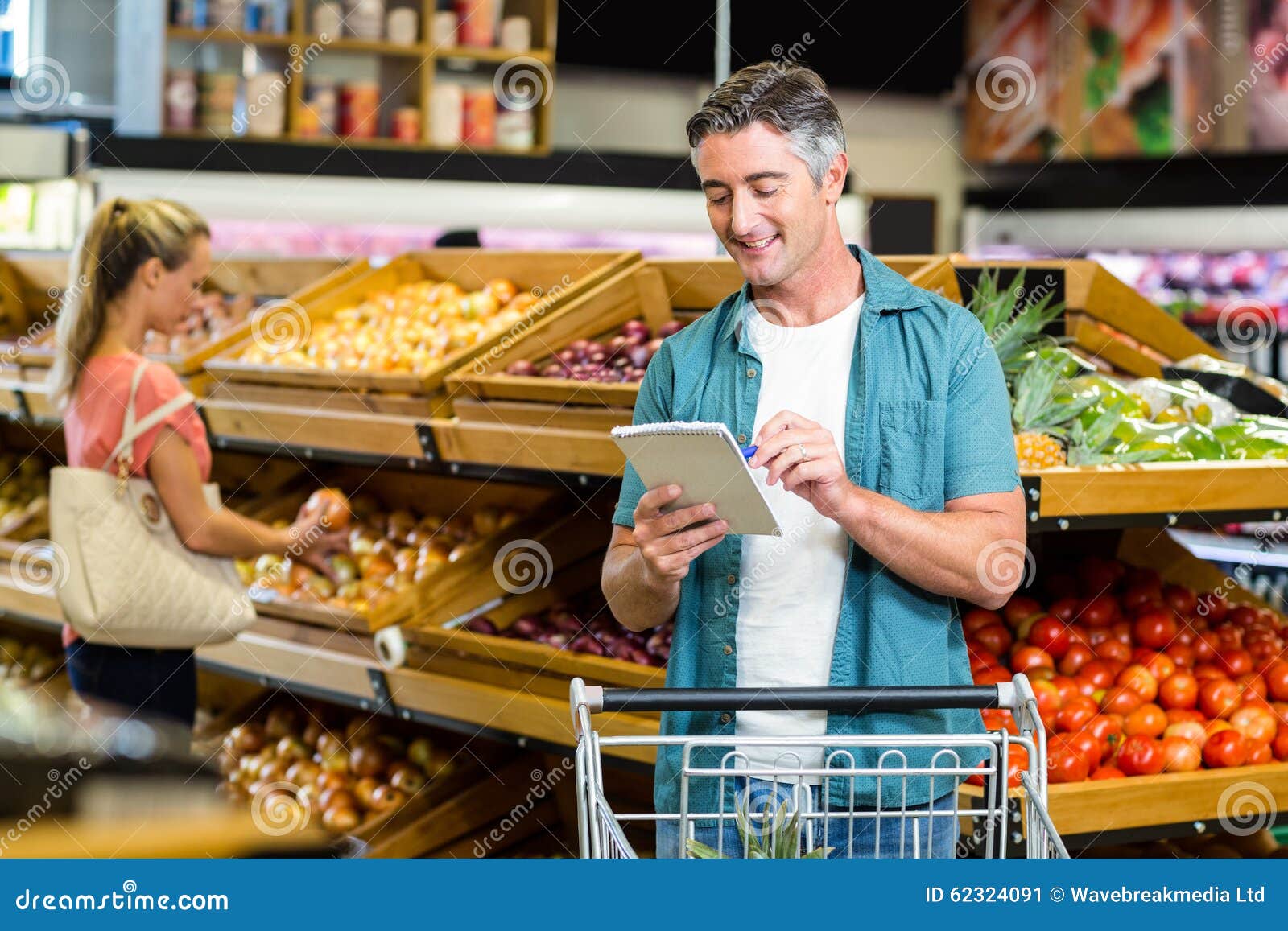 Smiling Man Looking at the Grocery List Stock Image - Image of drink ...