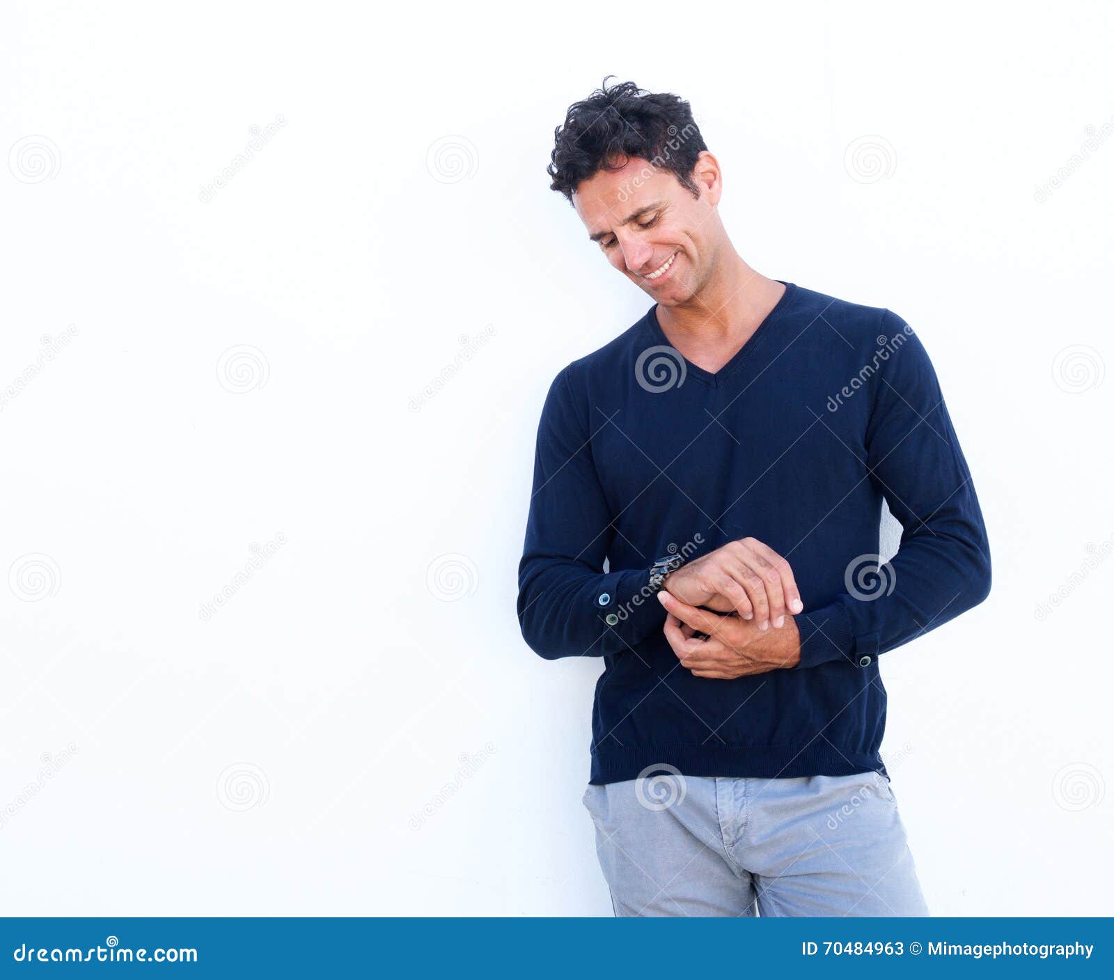 Smiling Man Looking at His Watch Stock Image - Image of cool ...