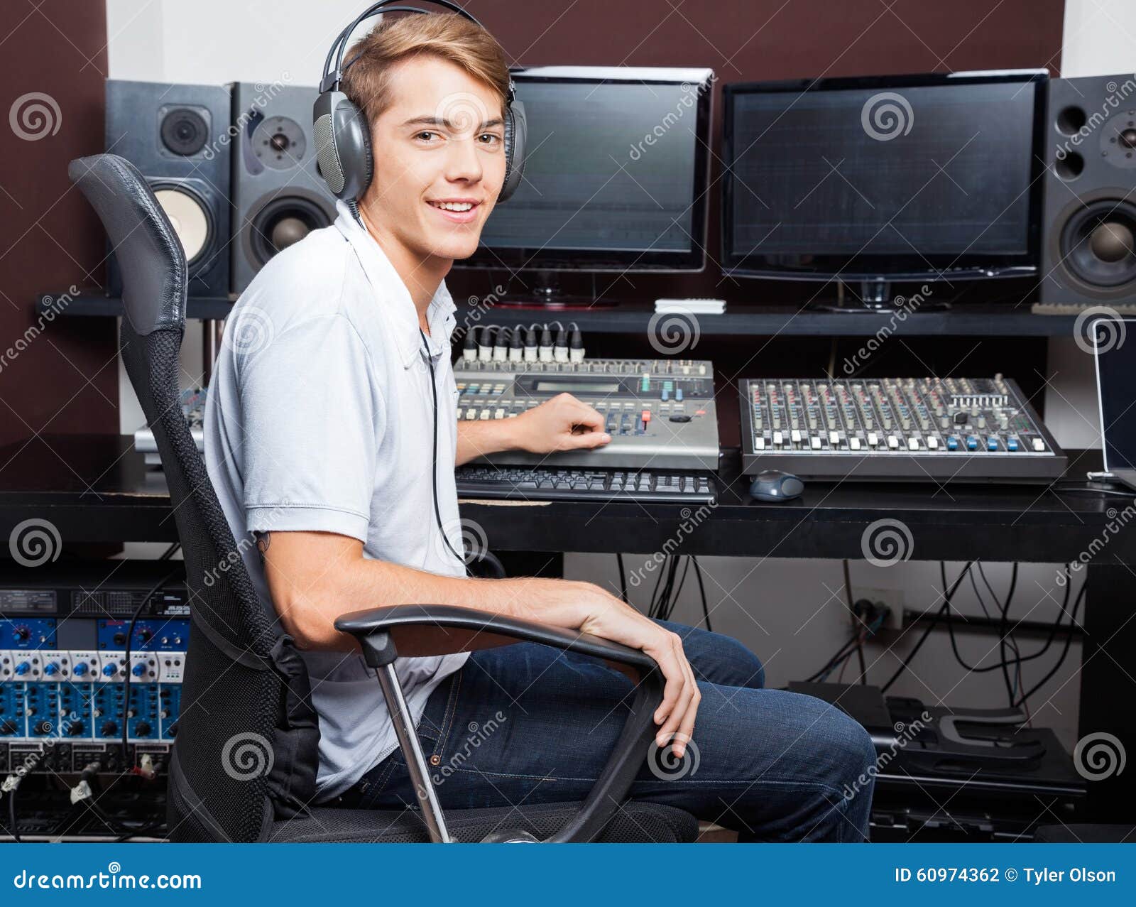 Smiling Man Mixing Audio in Recording Studio Stock Photo - Image of ...