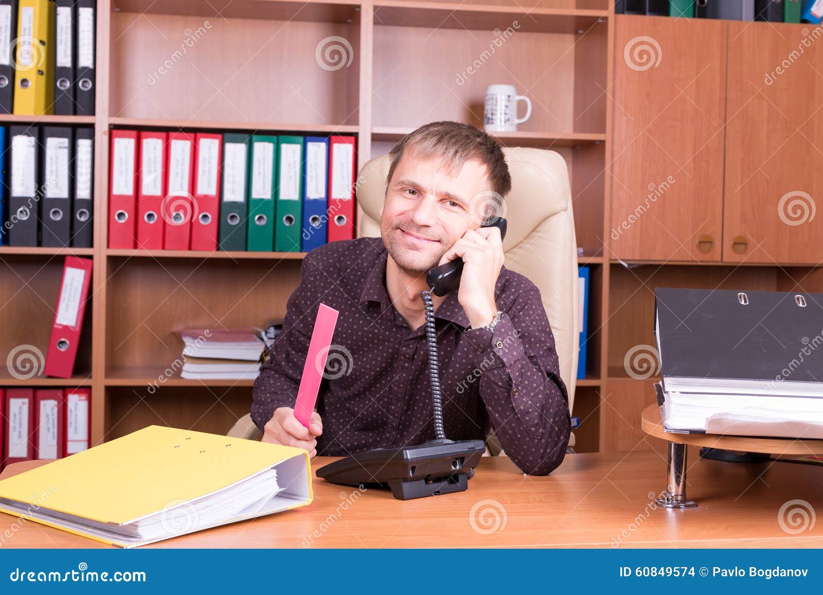 Smiling Man in Office Talking on Phone Stock Photo - Image of ...