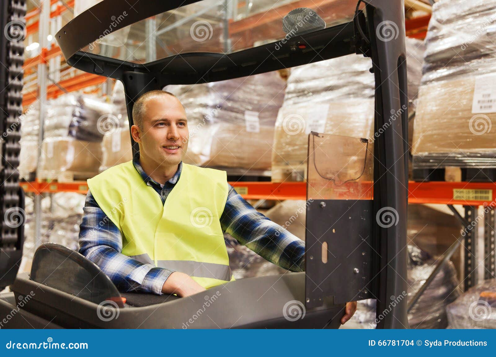 Smiling Man Operating Forklift Loader at Warehouse Stock Photo - Image ...