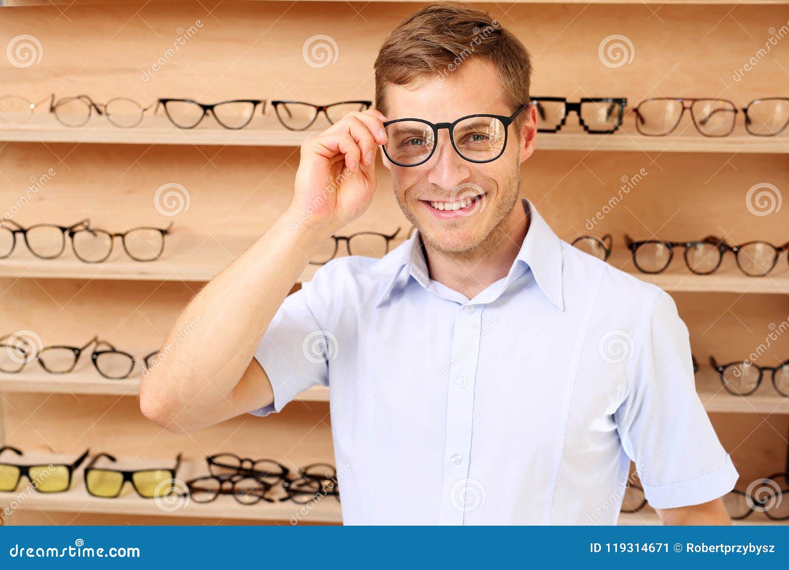 Smiling Man in the Optical Salon. Stock Image - Image of ...