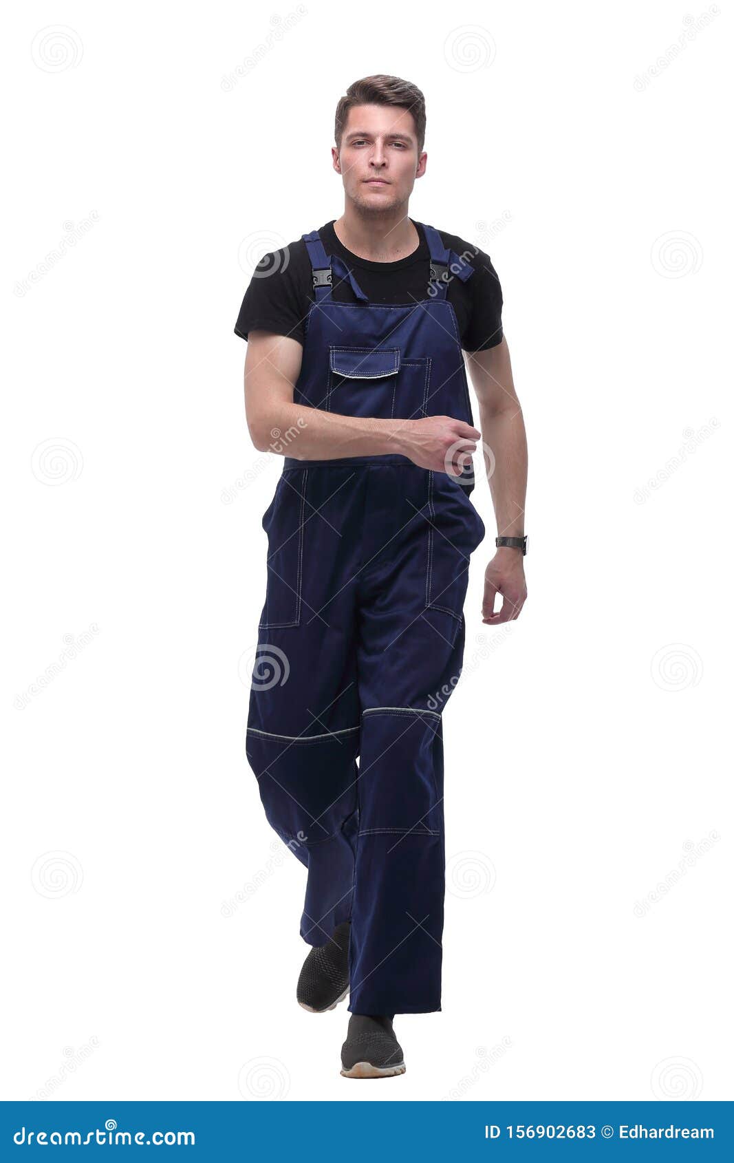 Smiling Man in Overalls Goes Forward.isolated on White Stock Image ...