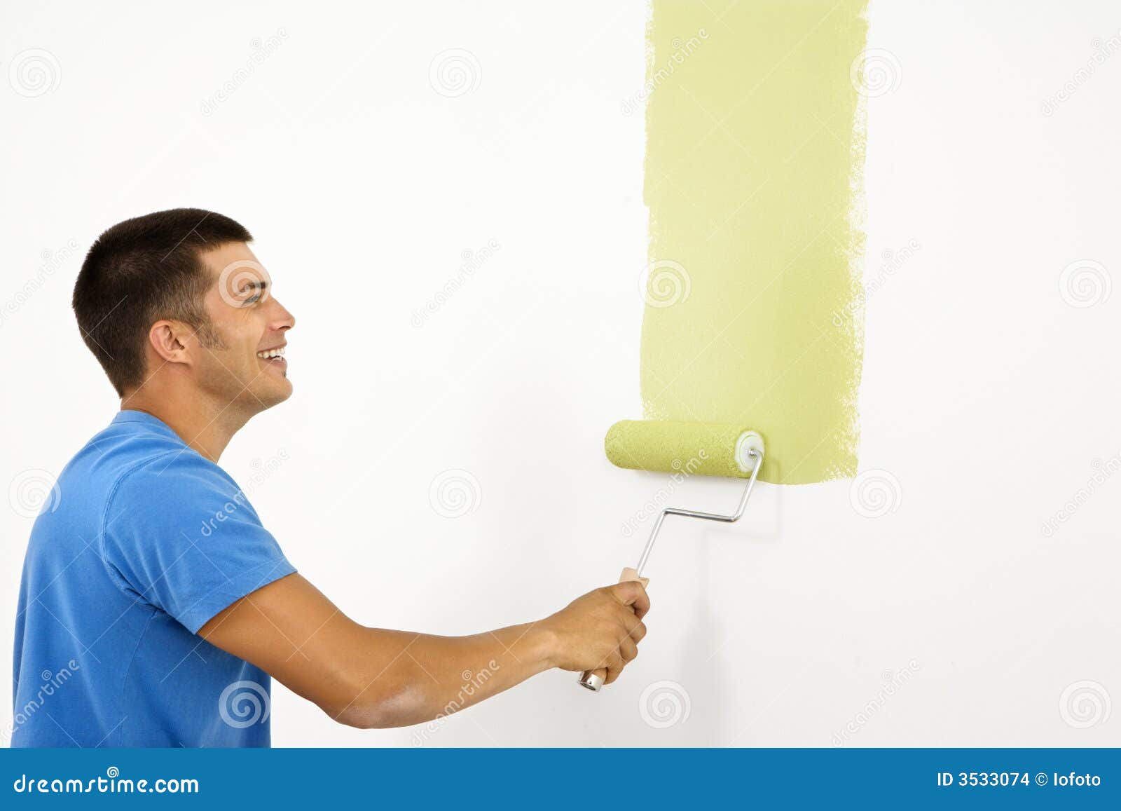 Smiling man painting. stock photo. Image of interior, improvement - 3533074