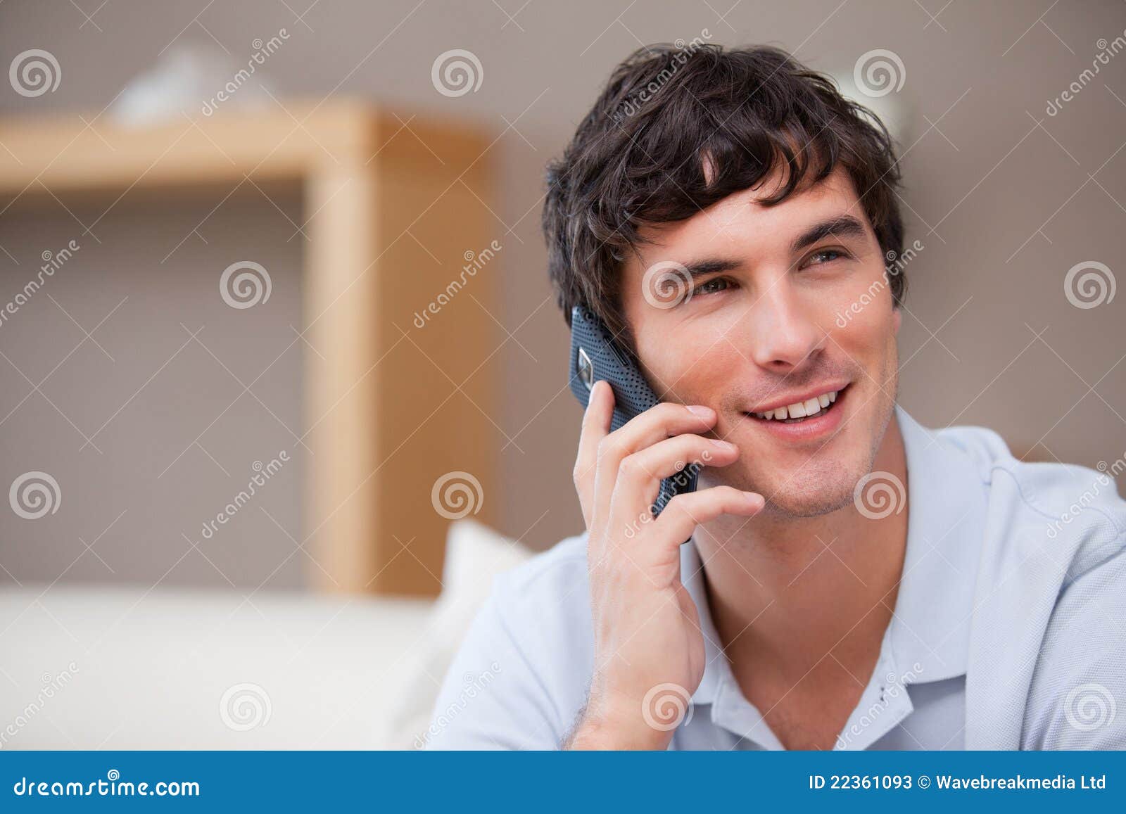 Smiling man on the phone stock image. Image of living - 22361093