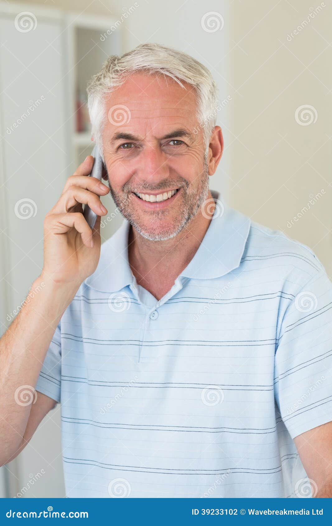 Smiling Man on a Phone Call Looking at Camera Stock Photo - Image of ...