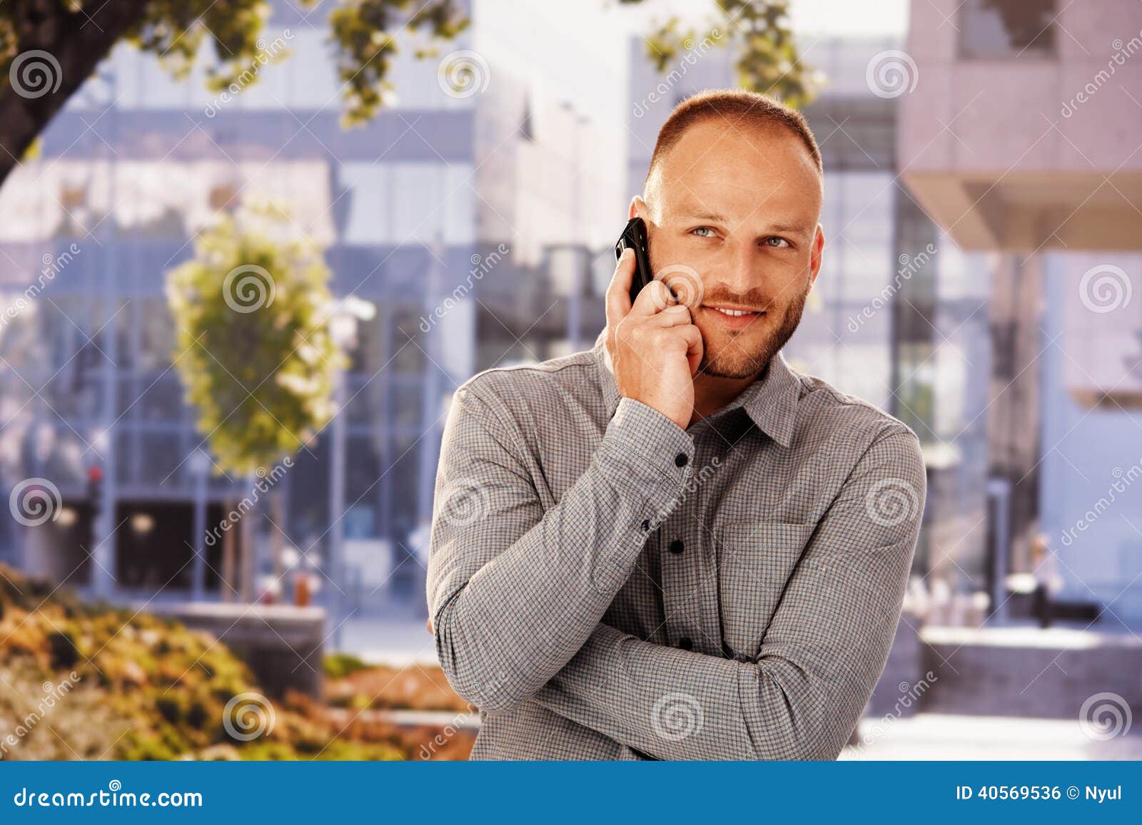 Smiling man on phone call stock photo. Image of caucasian - 40569536