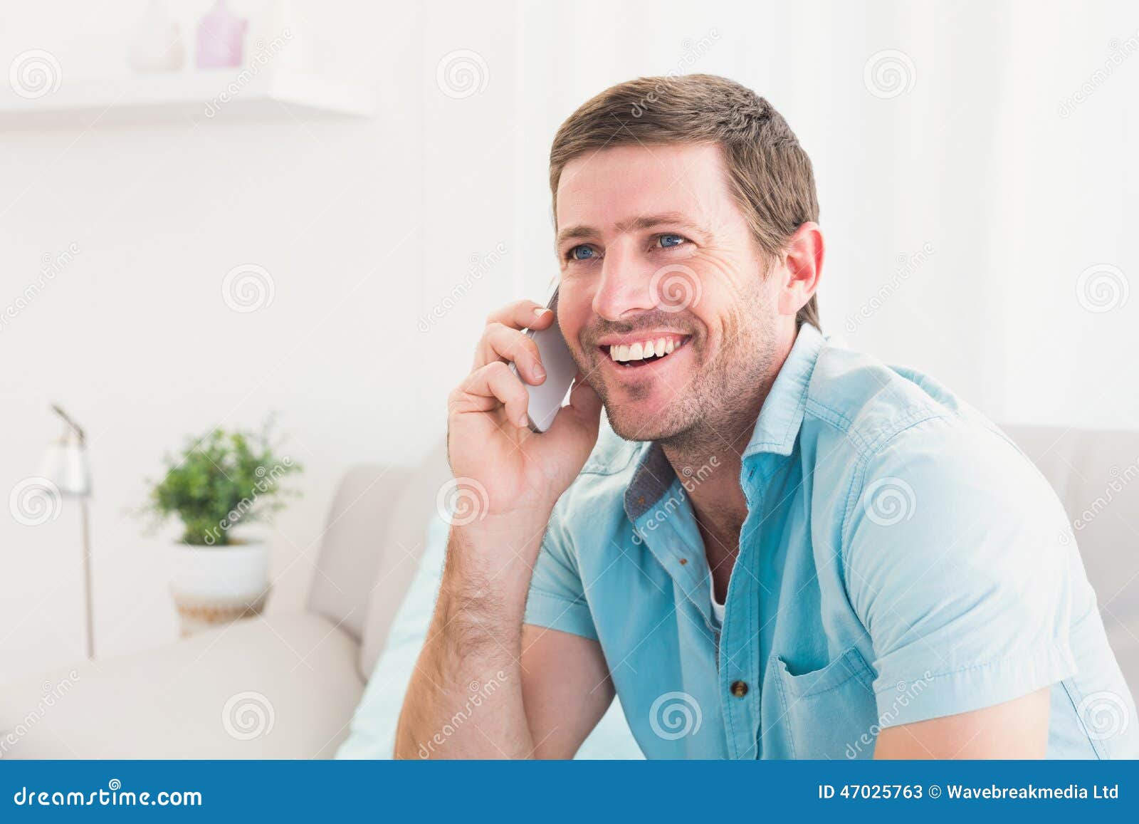 Smiling man on a phone stock image. Image of speaking - 47025763