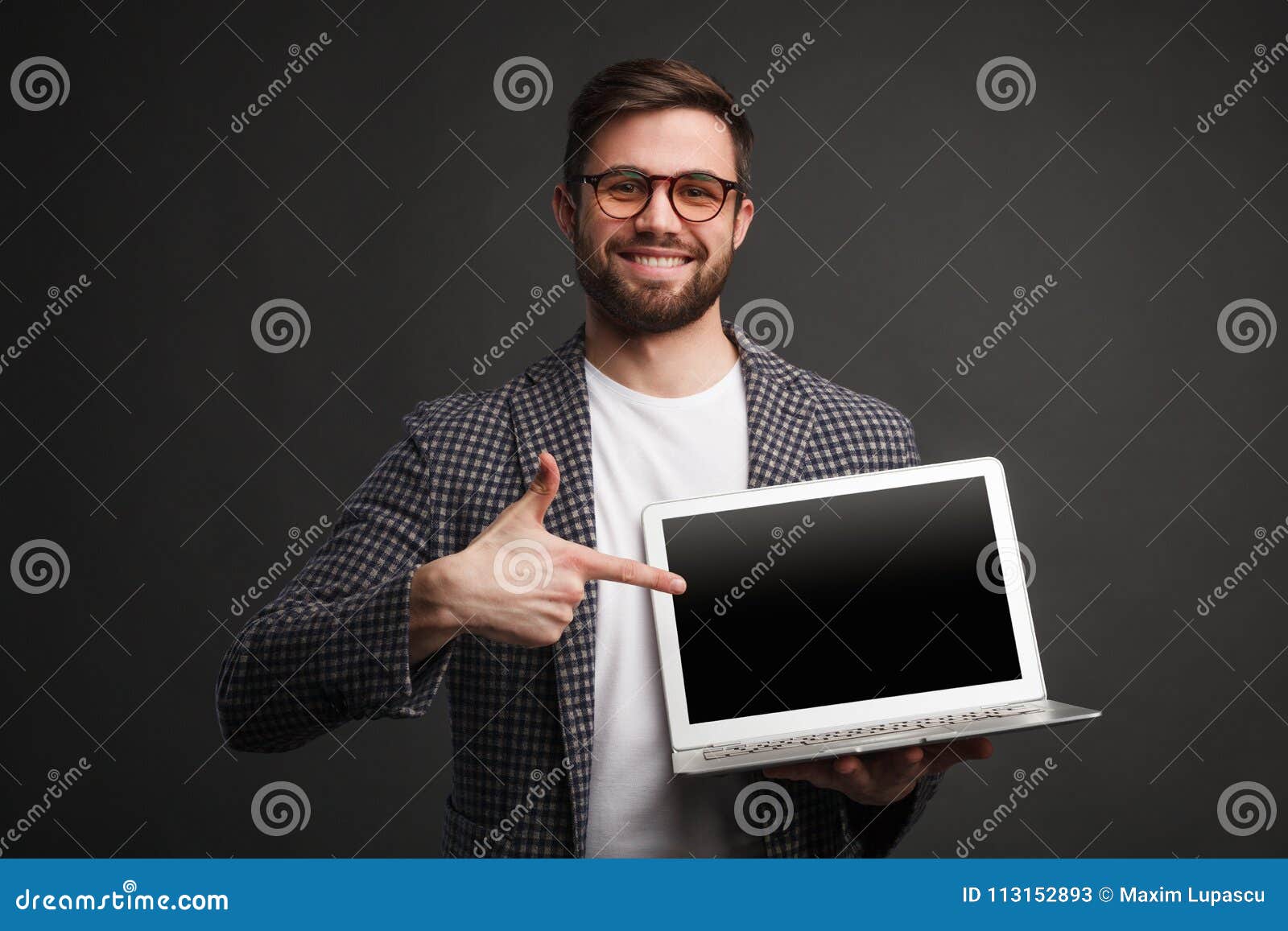 Smiling Man Pointing at Laptop Stock Image - Image of contemporary ...