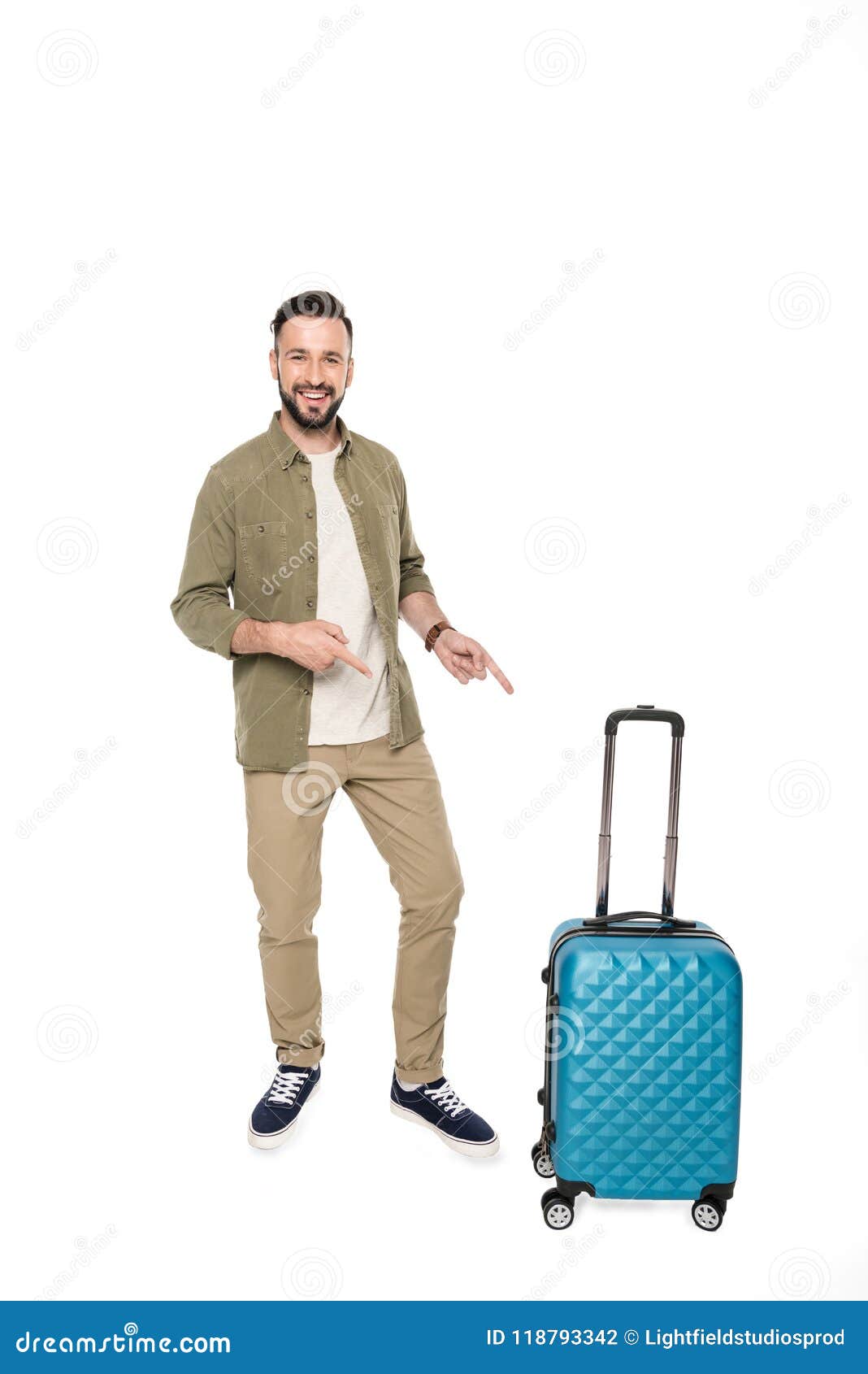 Smiling Man Pointing at Suitcase and Looking at Camera Stock Photo ...