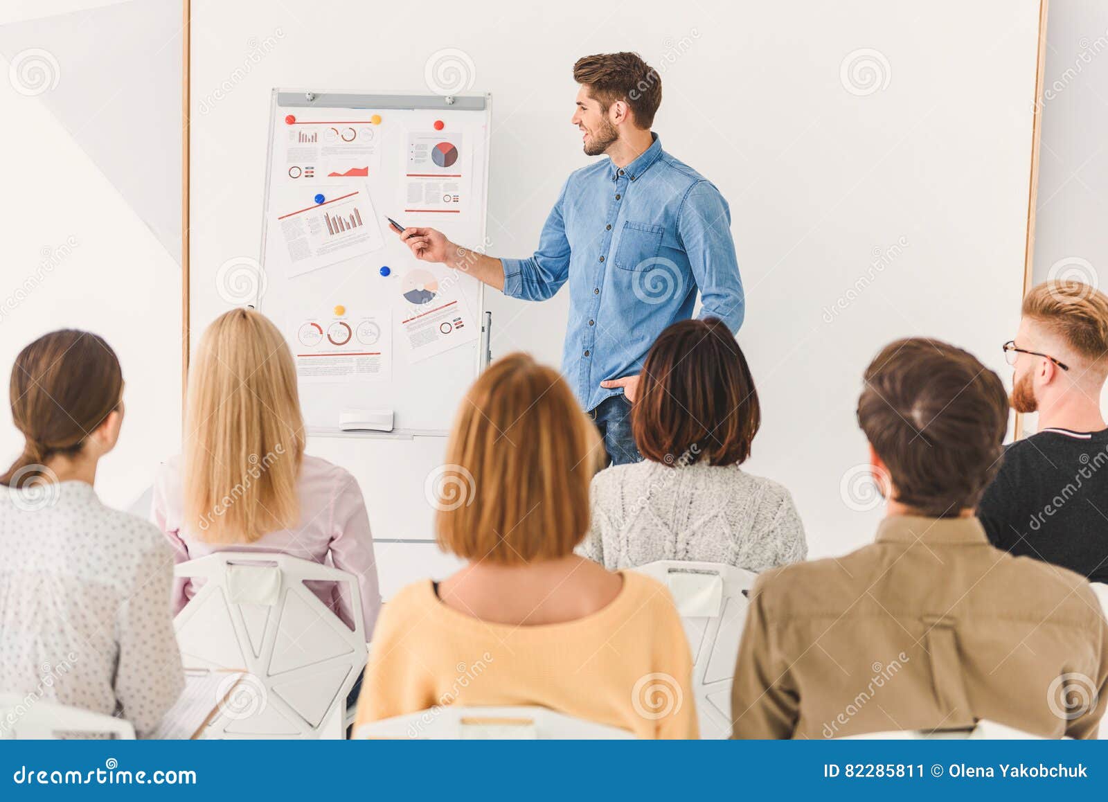 Smiling Man Presenting His Idea To Audience Stock Image - Image of ...