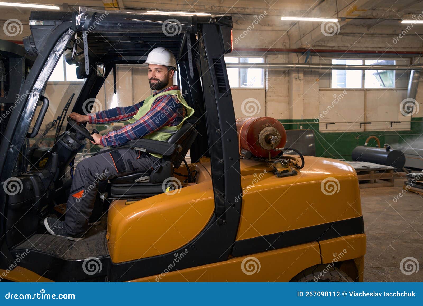 Professional Loader Transporting Goods by Car in the Workshop Stock ...