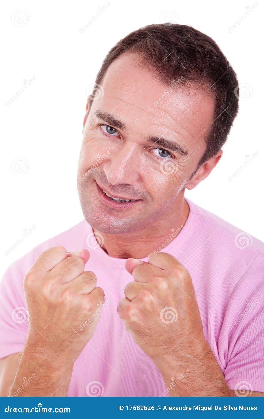 Smiling man punching fist stock photo. Image of fist - 17689626