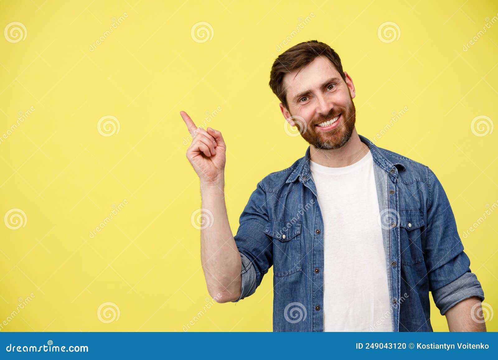 Smiling Man with Beard Raising His Finger Up and Pointing To Empty ...