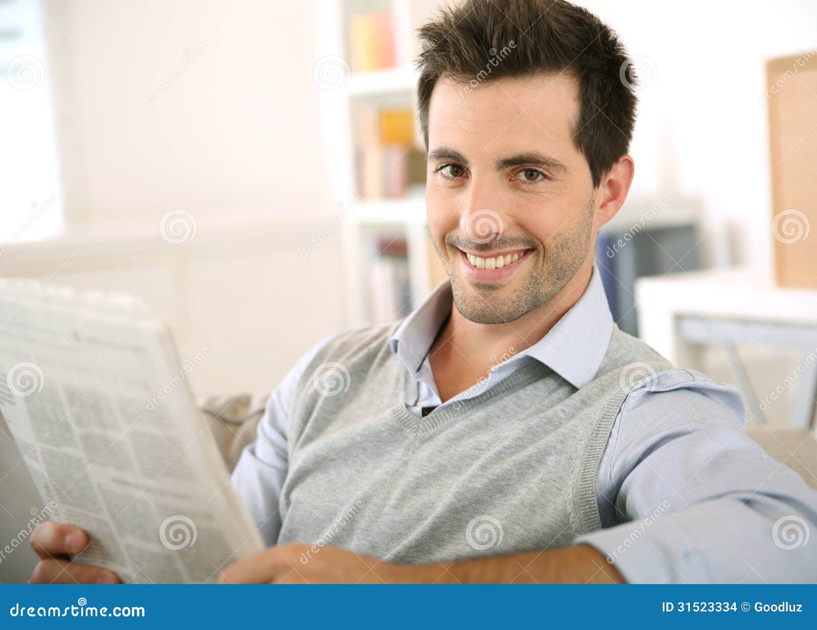 Smiling man reading news stock photo. Image of smile - 31523334