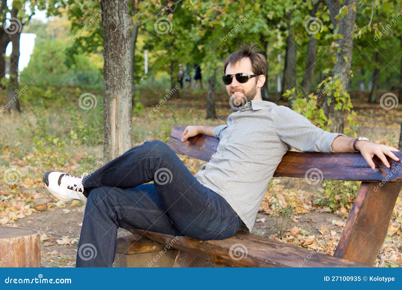 Smiling Man Relaxing on a Park Bench Stock Image - Image of person ...