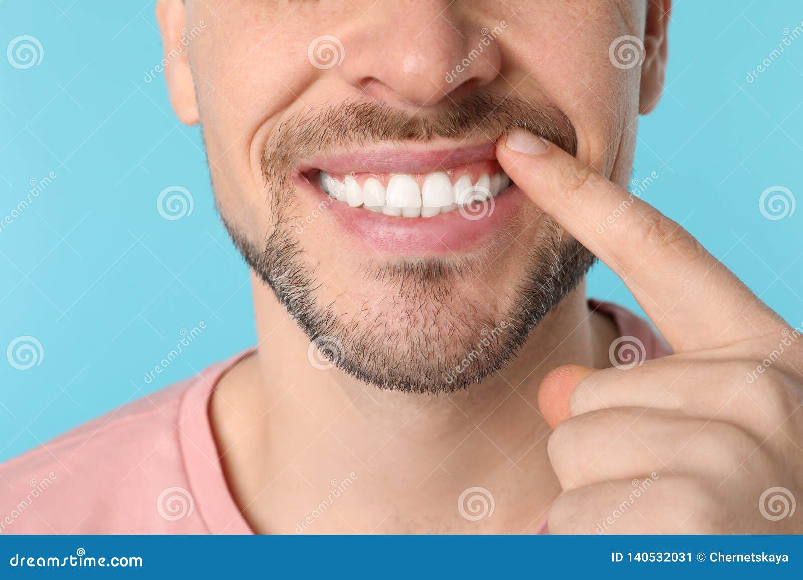 Smiling Man Showing Perfect Teeth on Color Background Stock Image ...